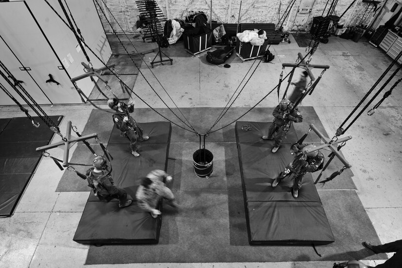 Aircrew participate in egress, emergency parachute training > Minot Air ...