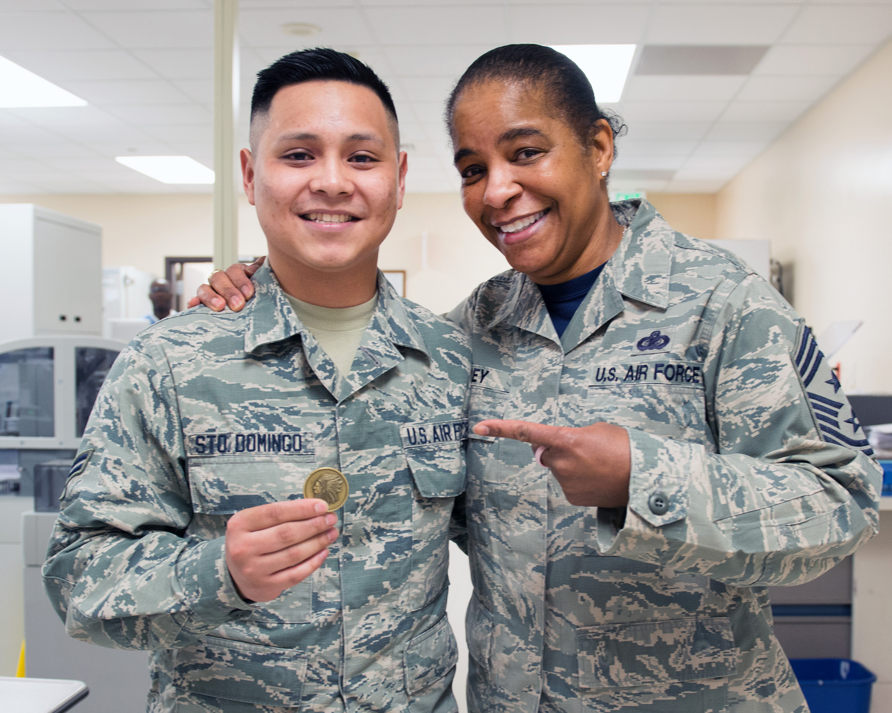 A coin forever links Airman, AMC command chief > Travis Air Force Base ...