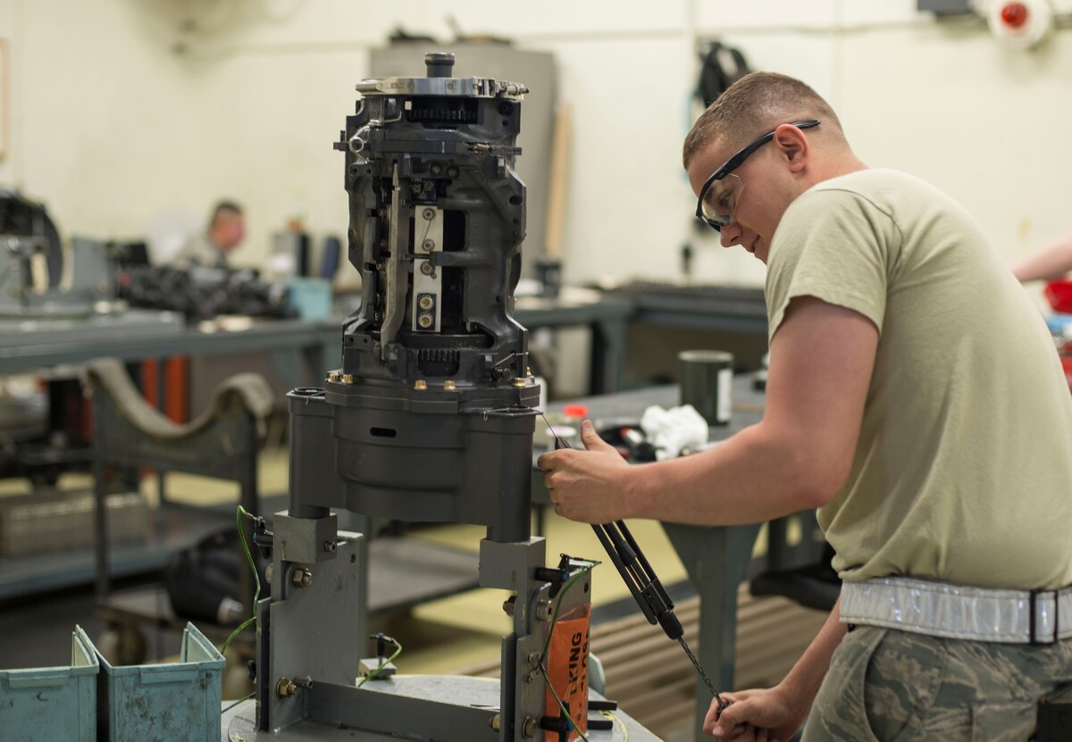 Armament technicians repair F-16 Gatling Gun > Misawa Air Base ...