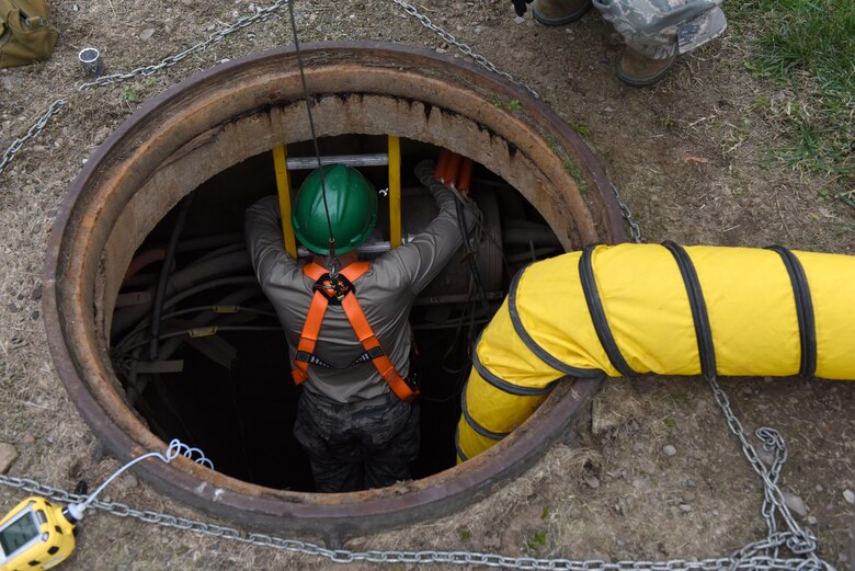 211th Engineering Installation Squadron Airmen install fiber optic ...