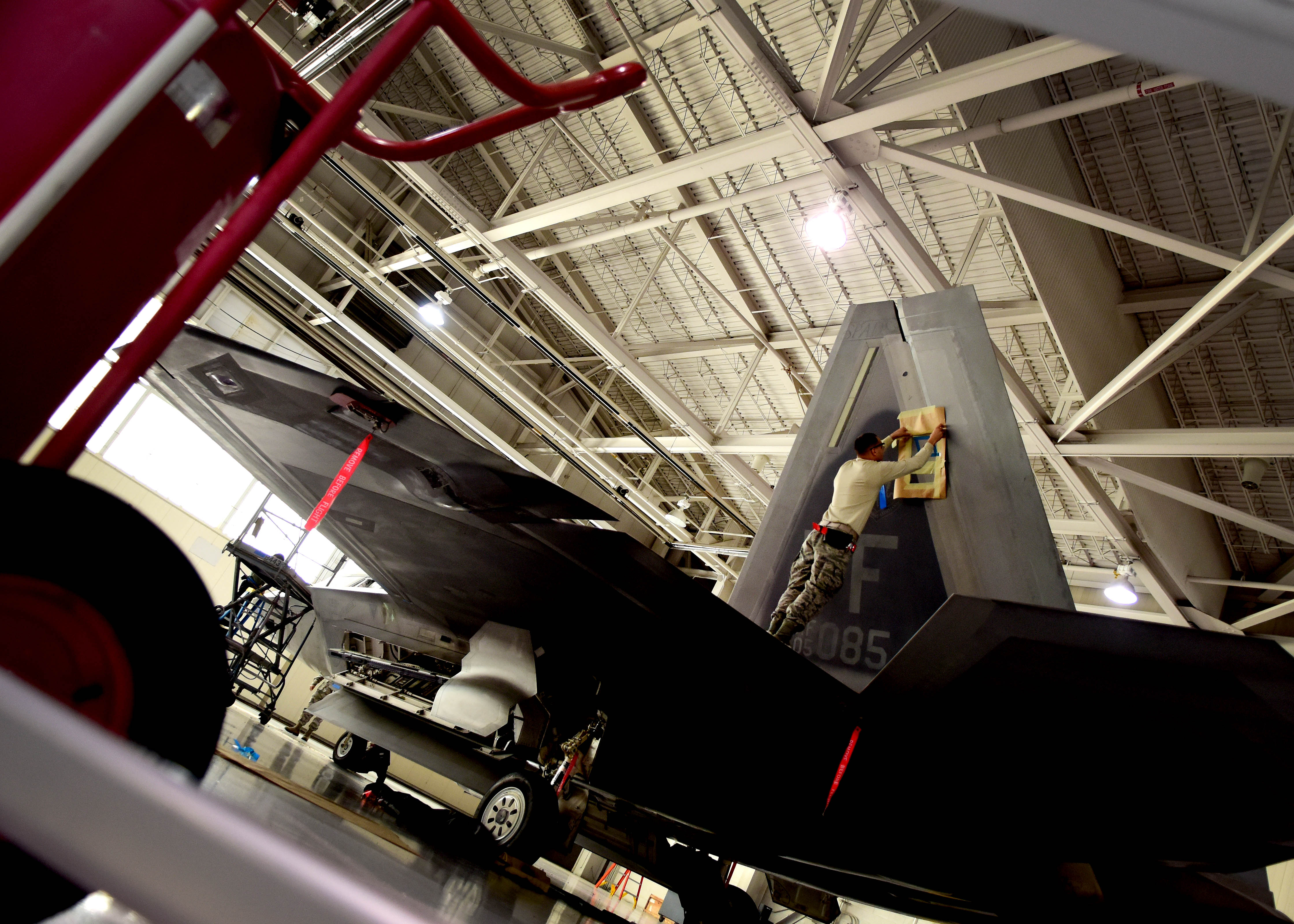 Low obseverable Airmen ensure F-22 stealth