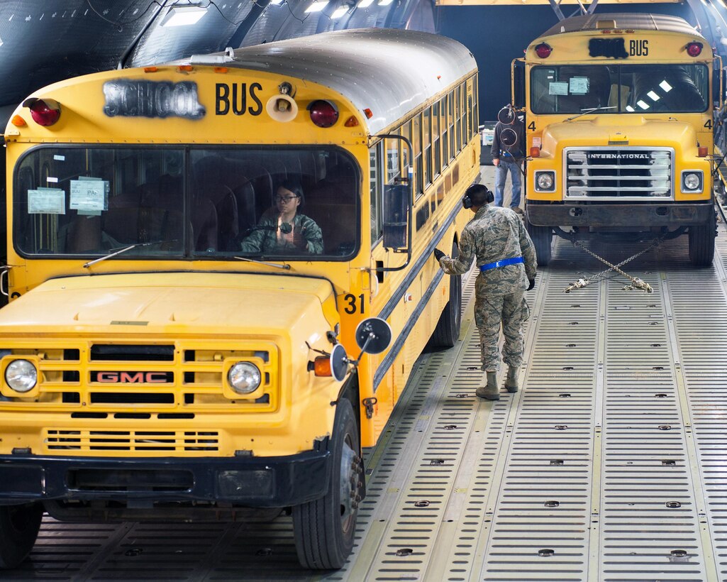 Mobility aircraft deliver buses to Haiti