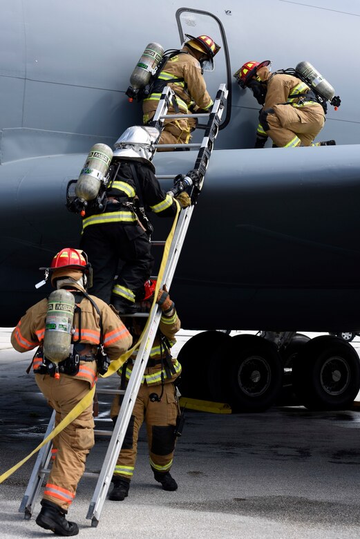 Andersen AFB Fire Department conducts an aircraft egress exercise ...