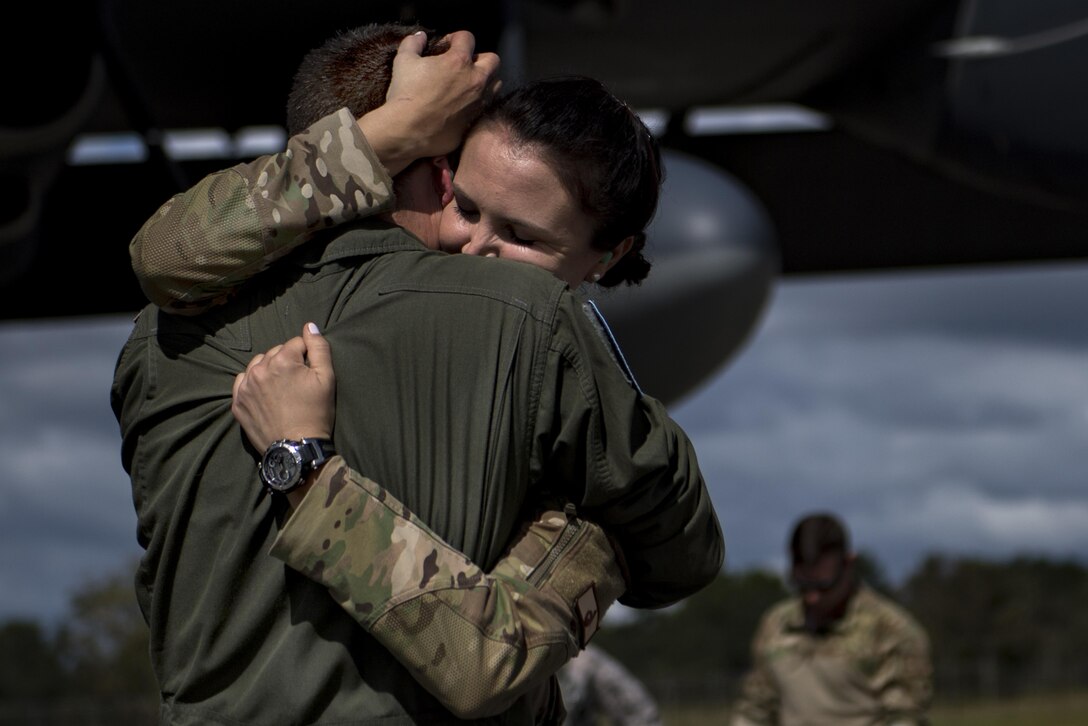 Loved ones welcome back rescue personnel
