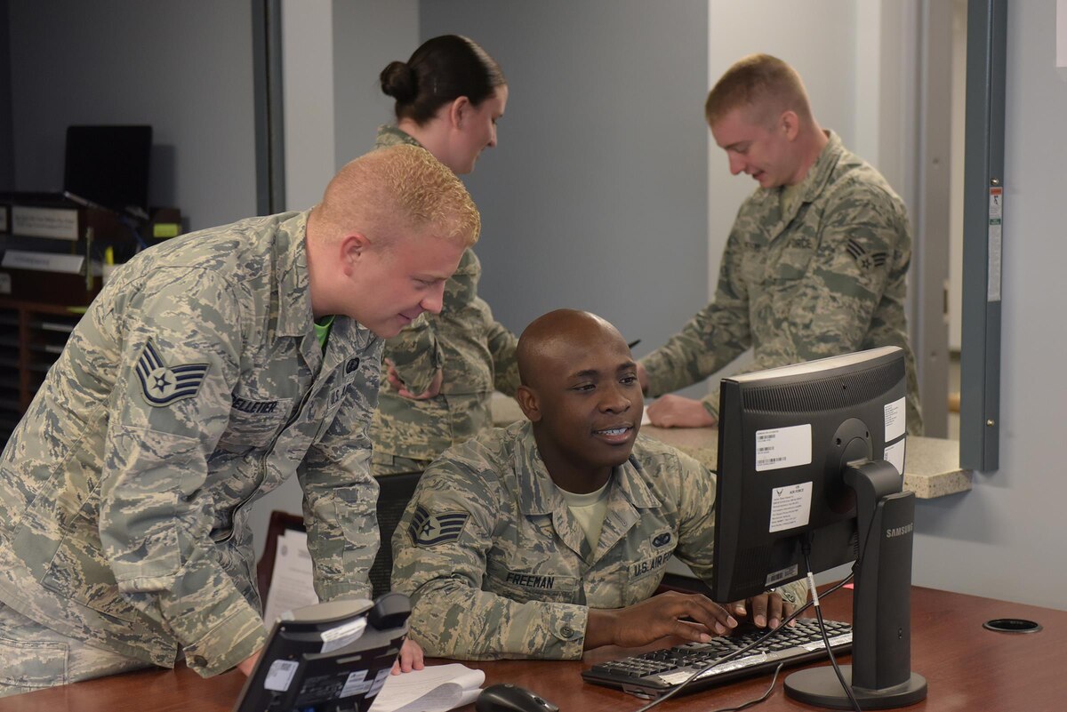 Finance office leans forward > 109th Airlift Wing > Display