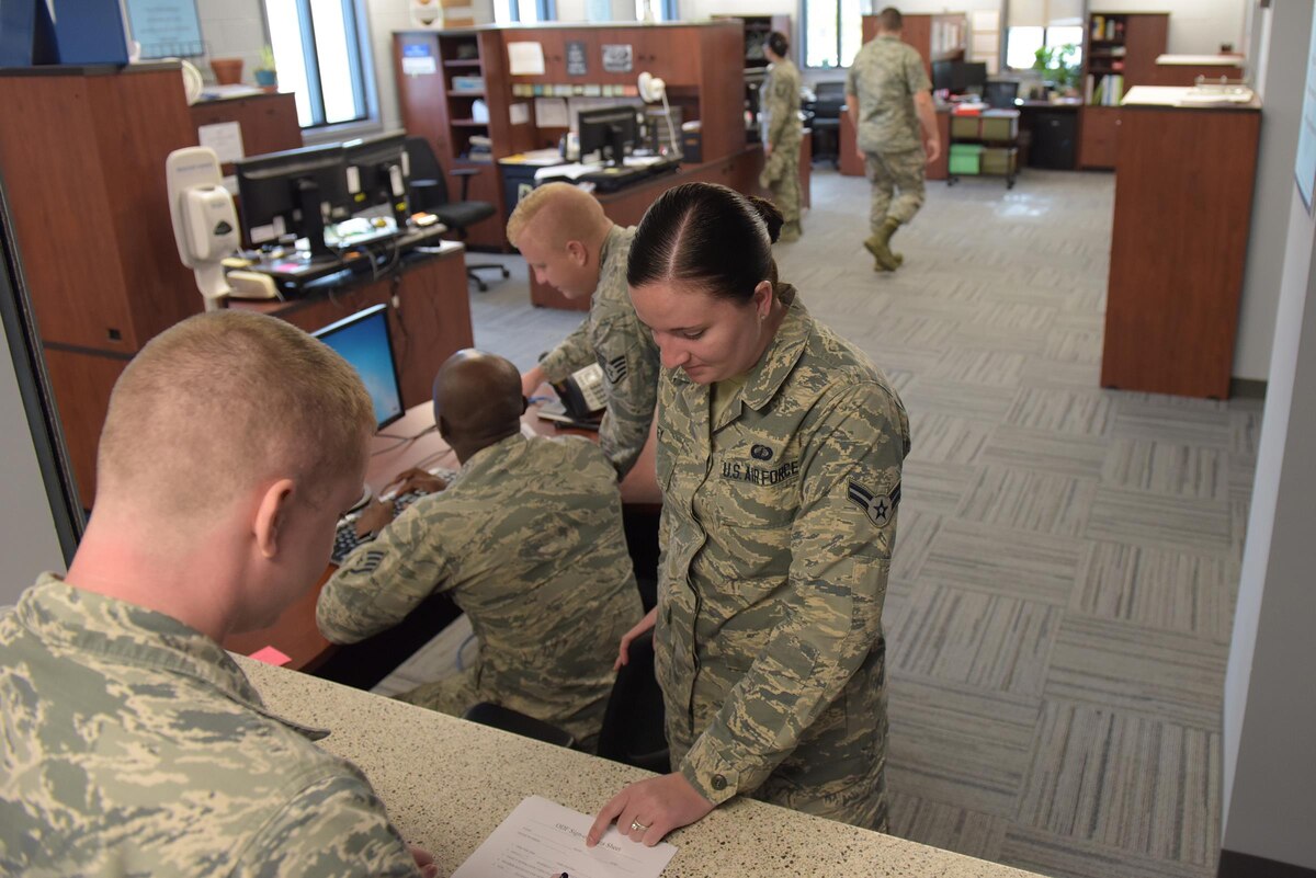Finance office leans forward > 109th Airlift Wing > Display