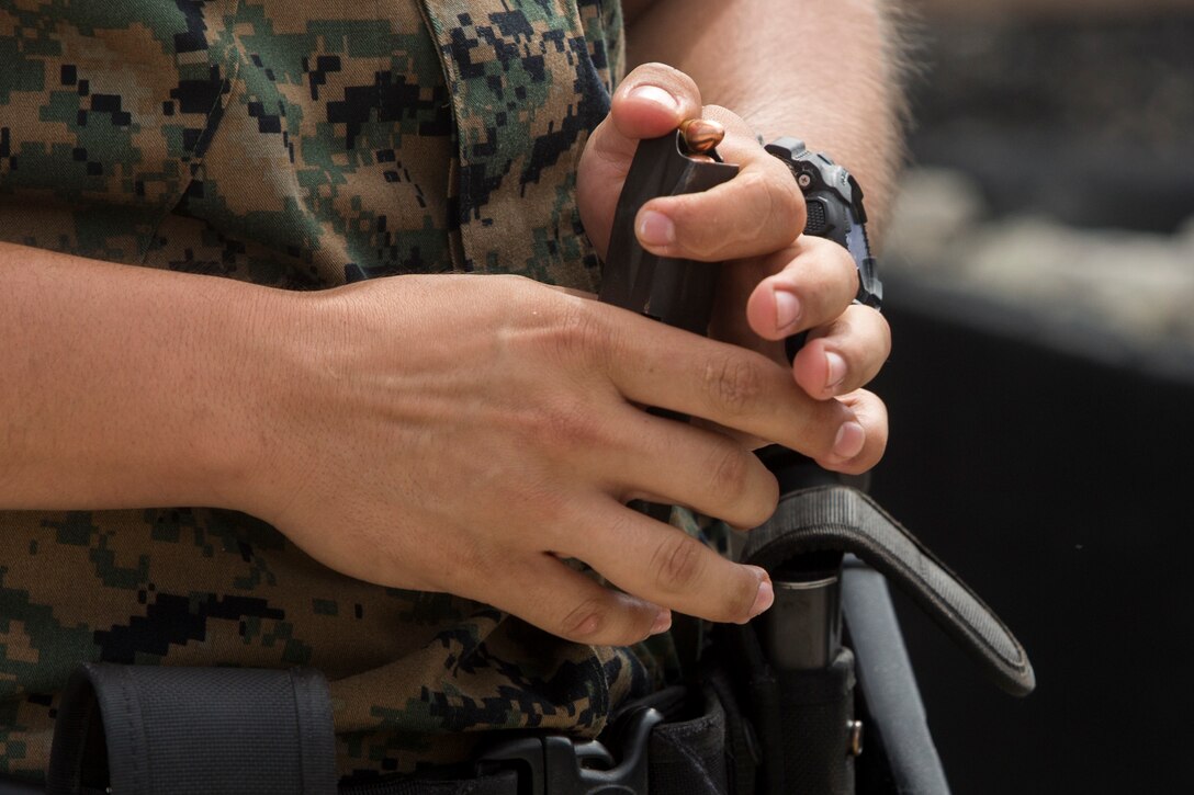 Absorbing the recoil: MPs fire the Beretta and M1014