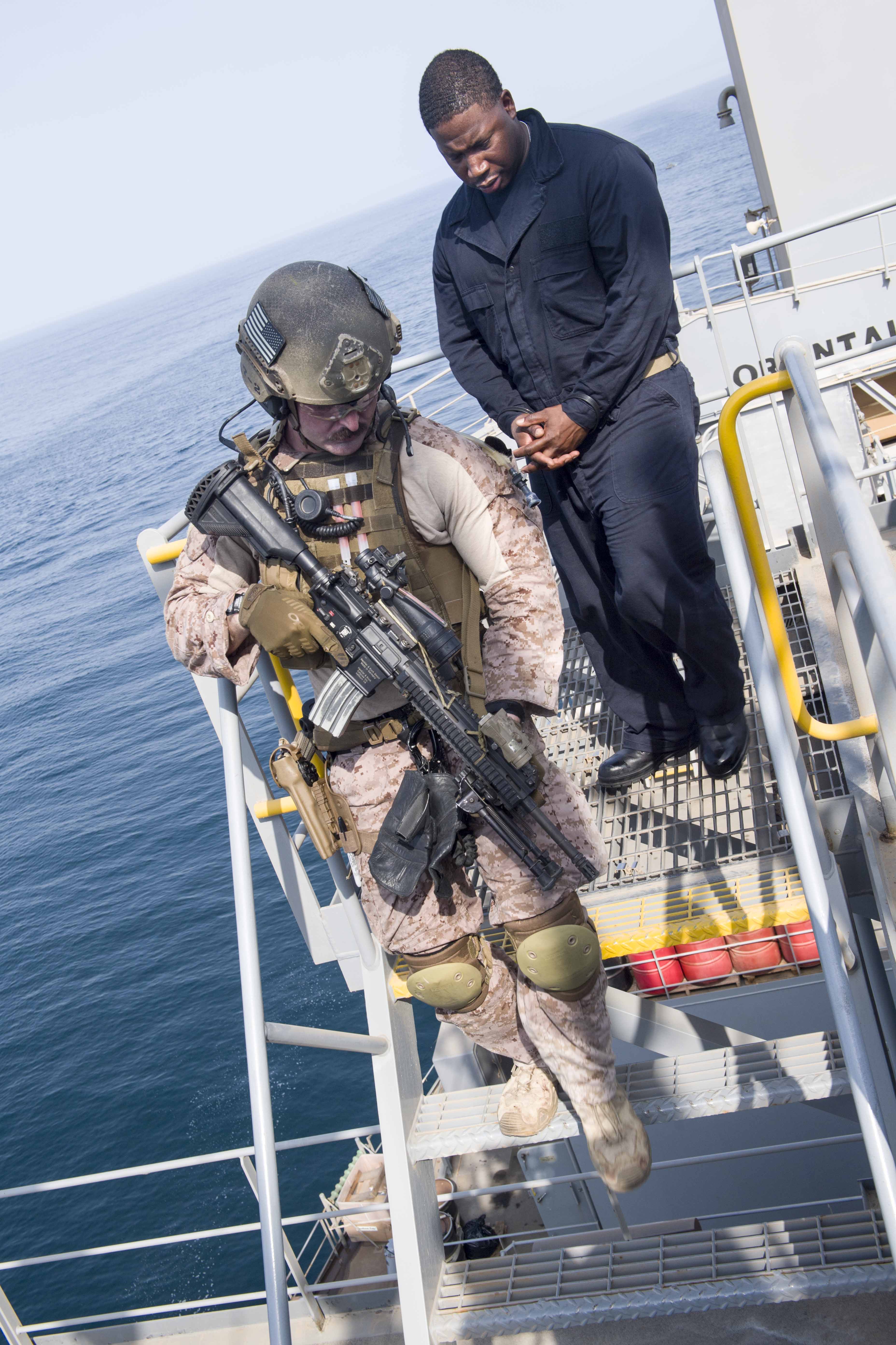 15th MEU Marines from USS Pearl Harbor support VBSS exercise aboard ...