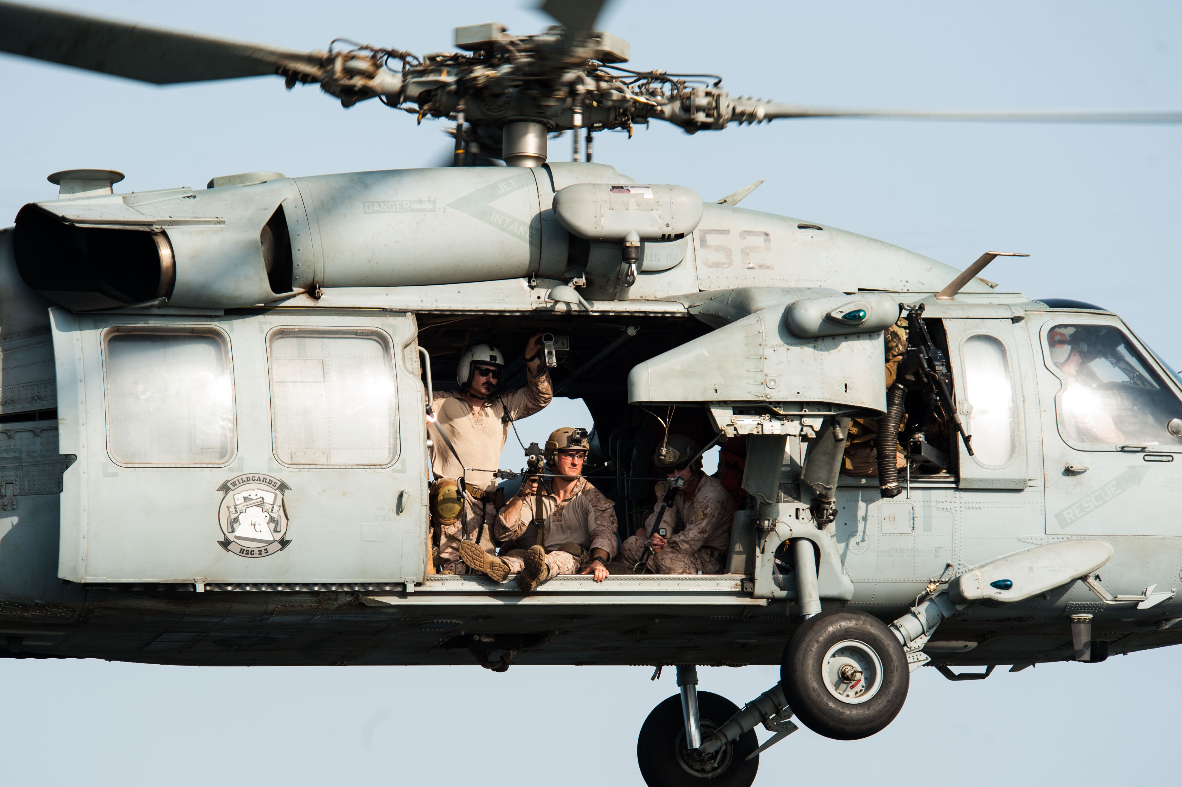 Sailor directs a helicopter for take off