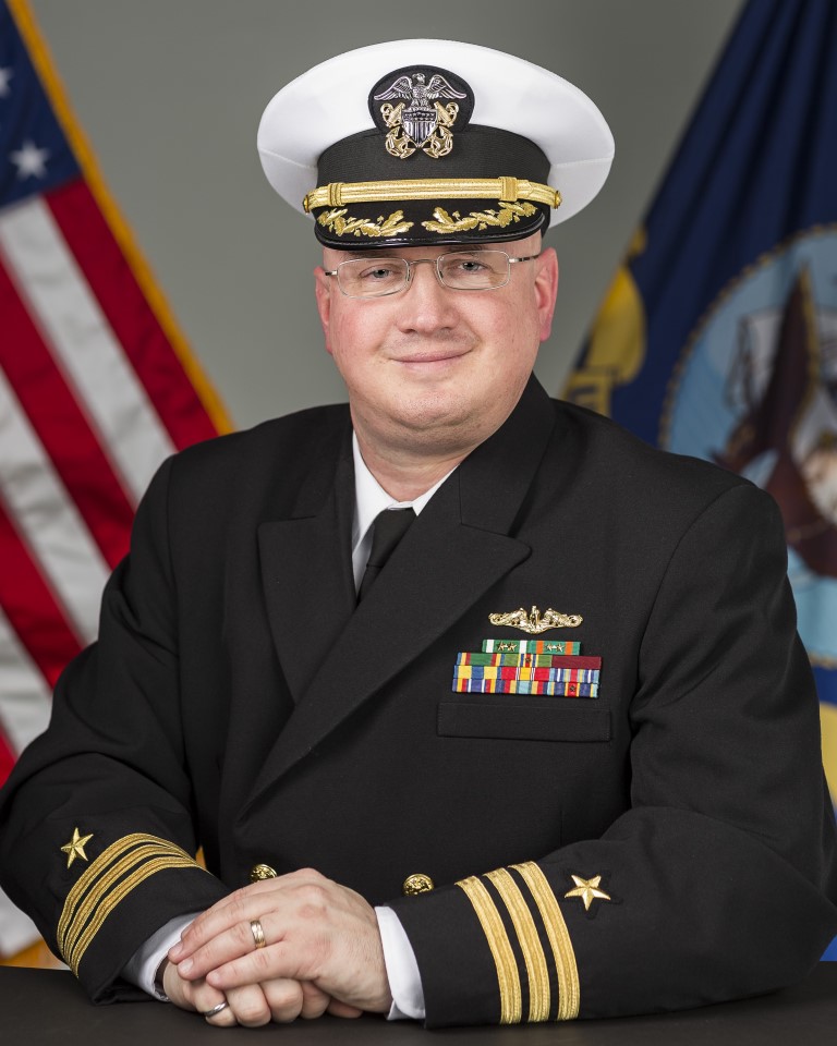 Commander Mark A. Schuchmann, USN
