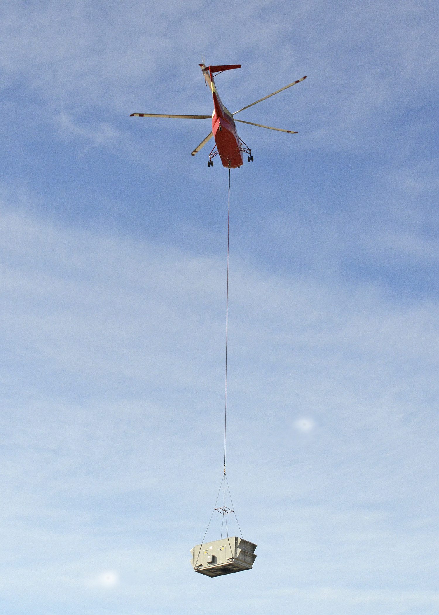 Helicopter lifts out old coolers, drops in new > Edwards Air Force Base ...