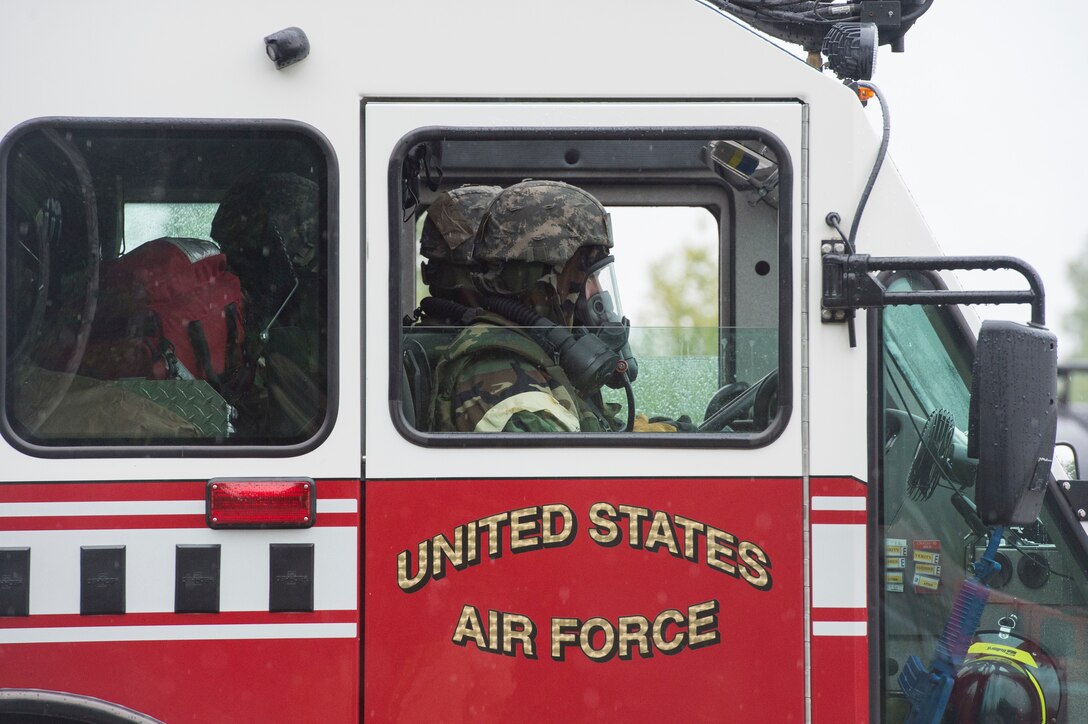 Air Force fire protection specialists conduct wartime-firefighting ...