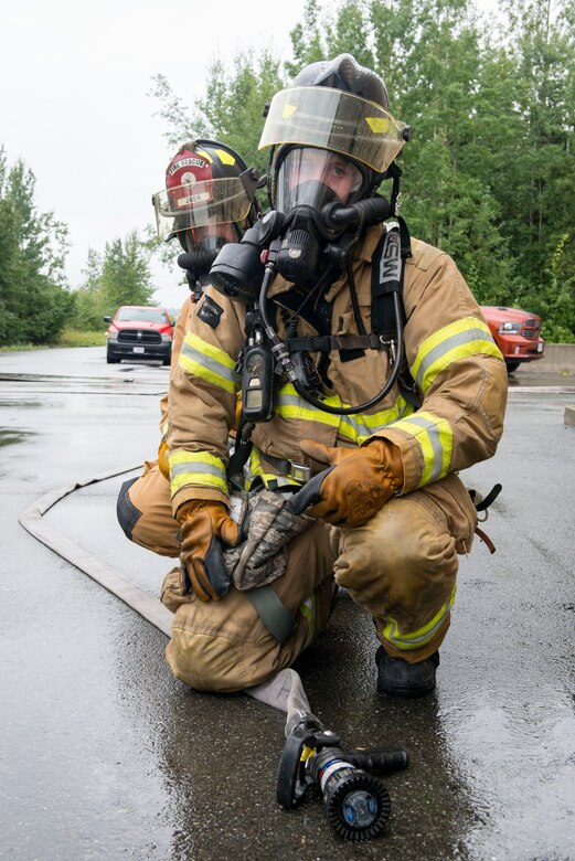 Air Force fire protection specialists conduct wartime-firefighting ...