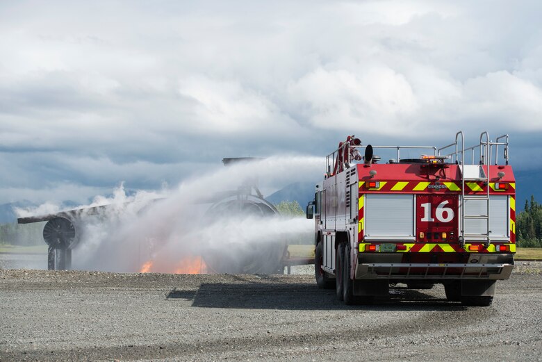 Air Force fire protection specialists conduct wartime-firefighting ...