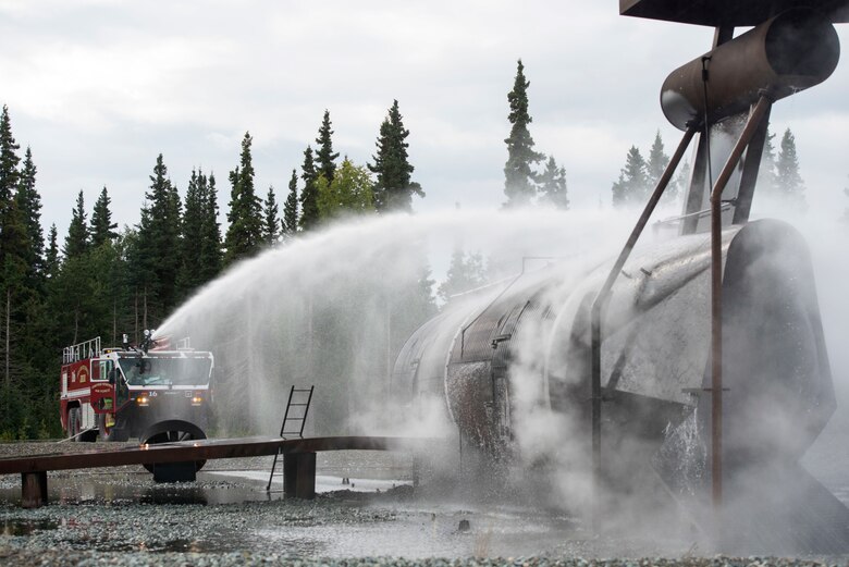 Air Force fire protection specialists conduct wartime-firefighting ...