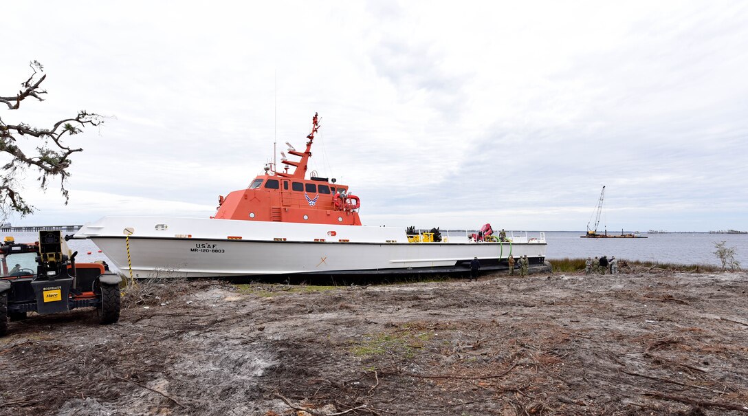 Sailors, Tyndall personnel partner to return vessel to water