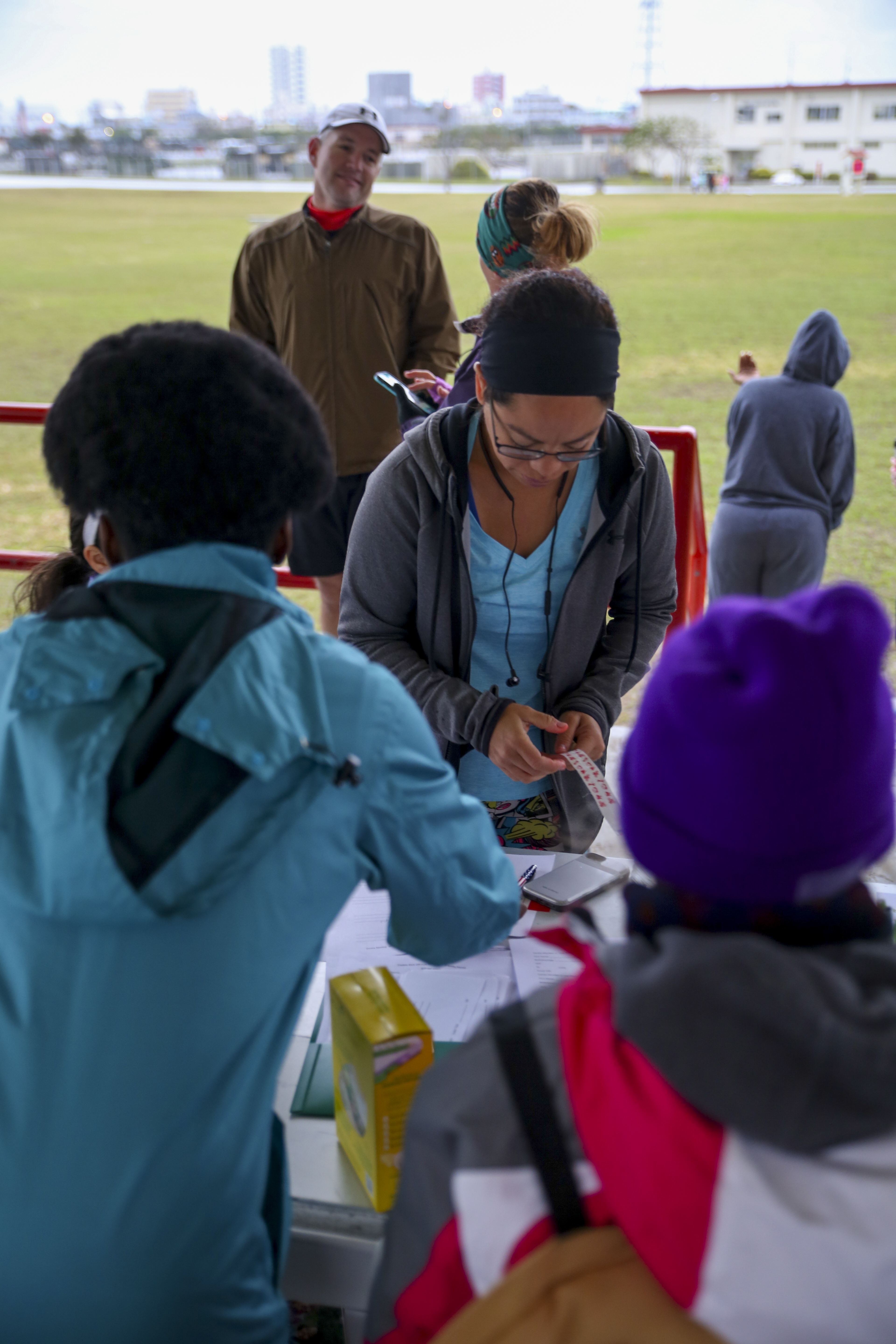 Foster Girl Scouts promote cookie sales through 5 km run