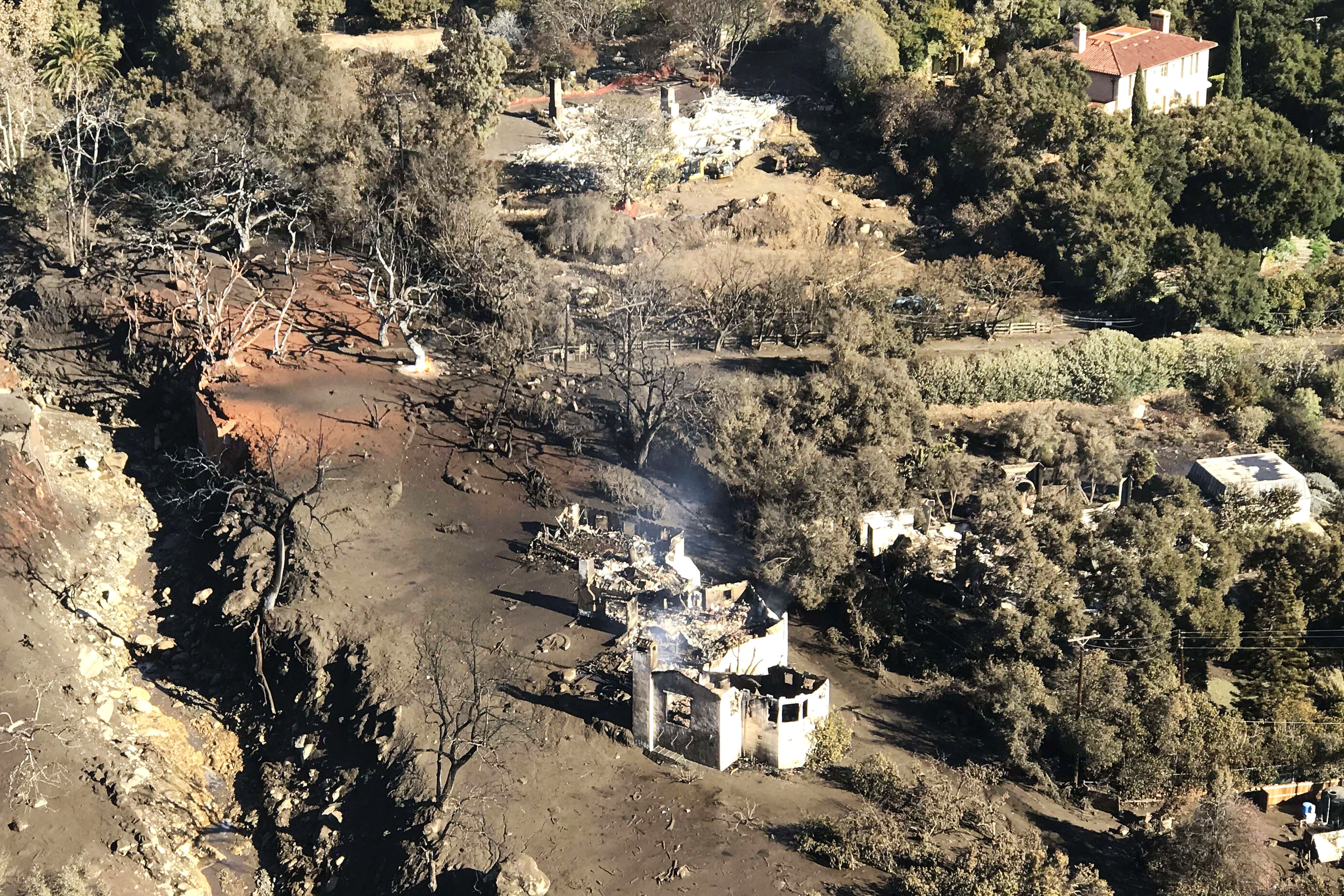 Smoldering Building | U.S. Department of War
