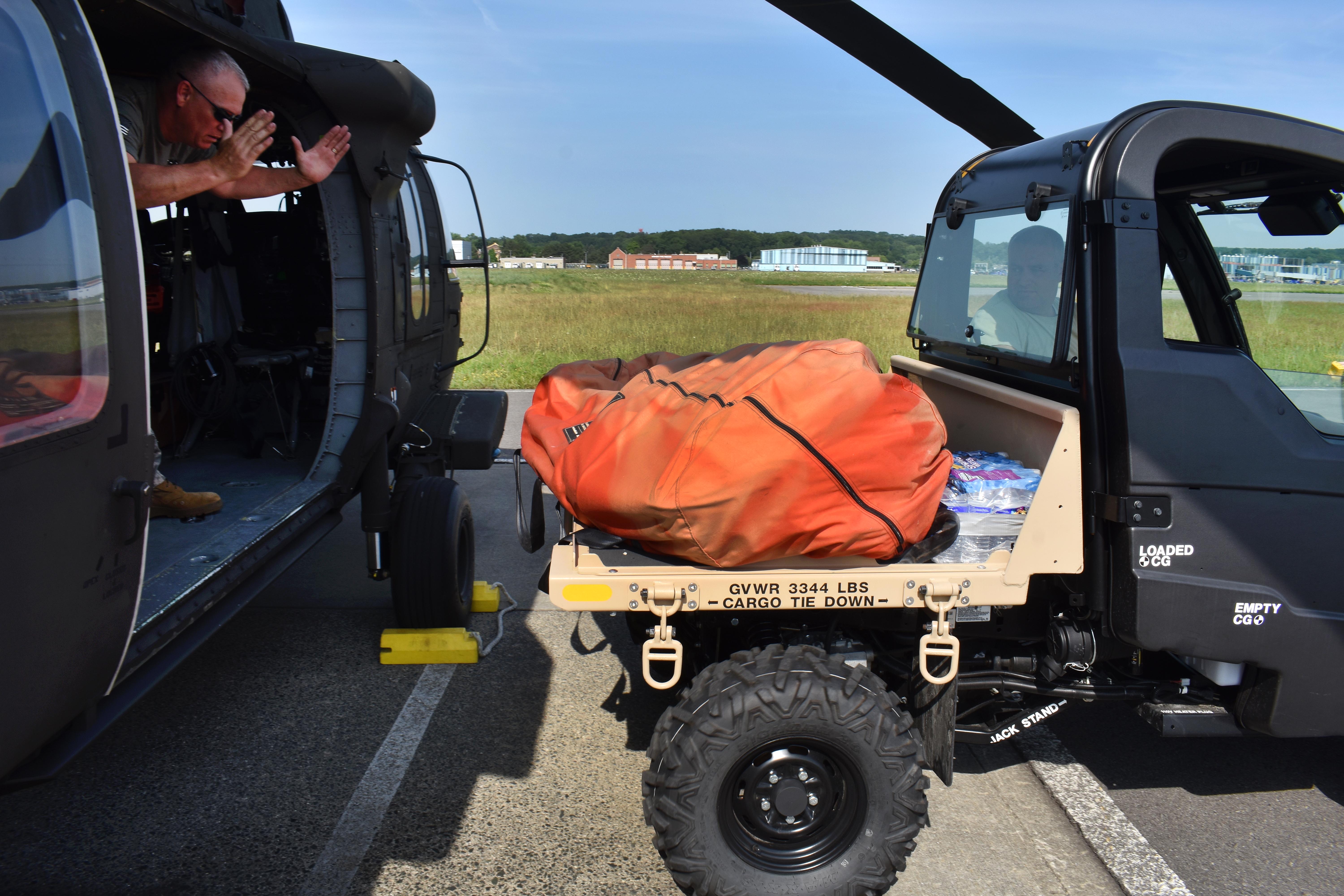 Loading A Firefighting System | U.S. Department of War