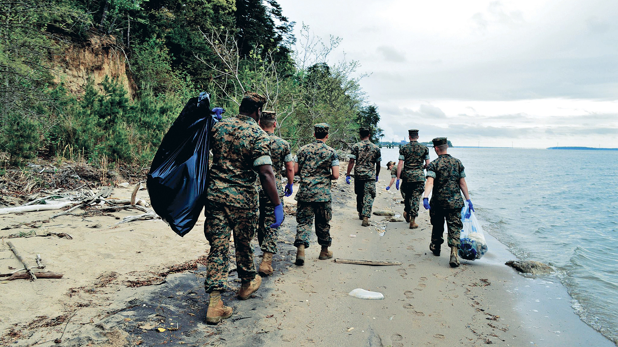 Marine environmental engineers help keep the base clean and safe ...