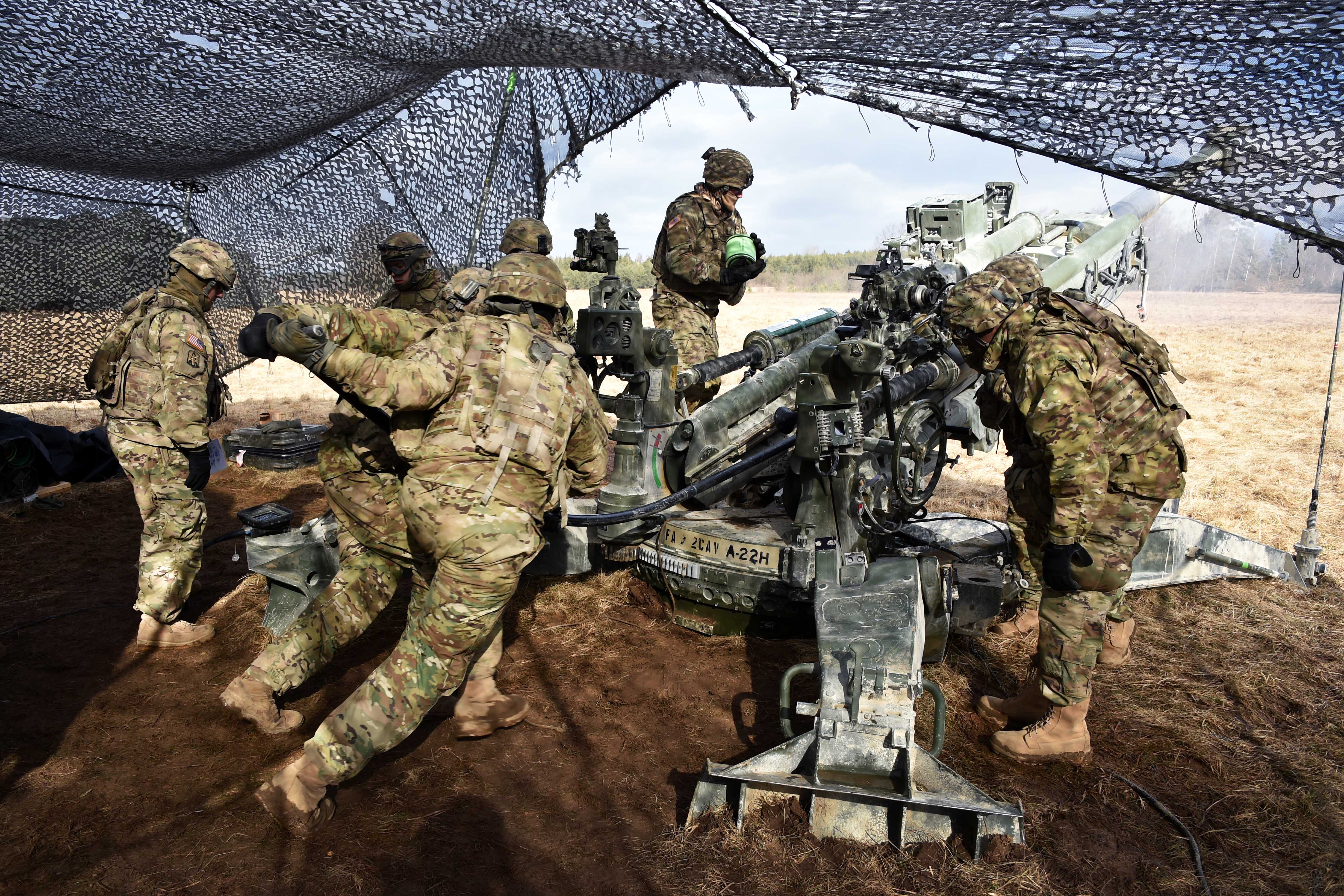 Firing A Howitzer | U.S. Department of War