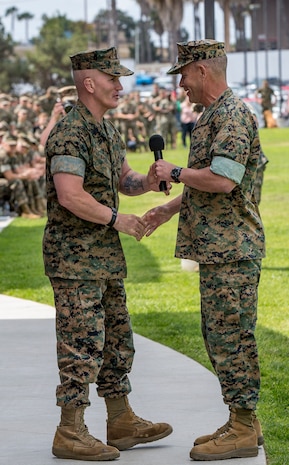 Sgt. Maj. Kasal passes on the sword of office