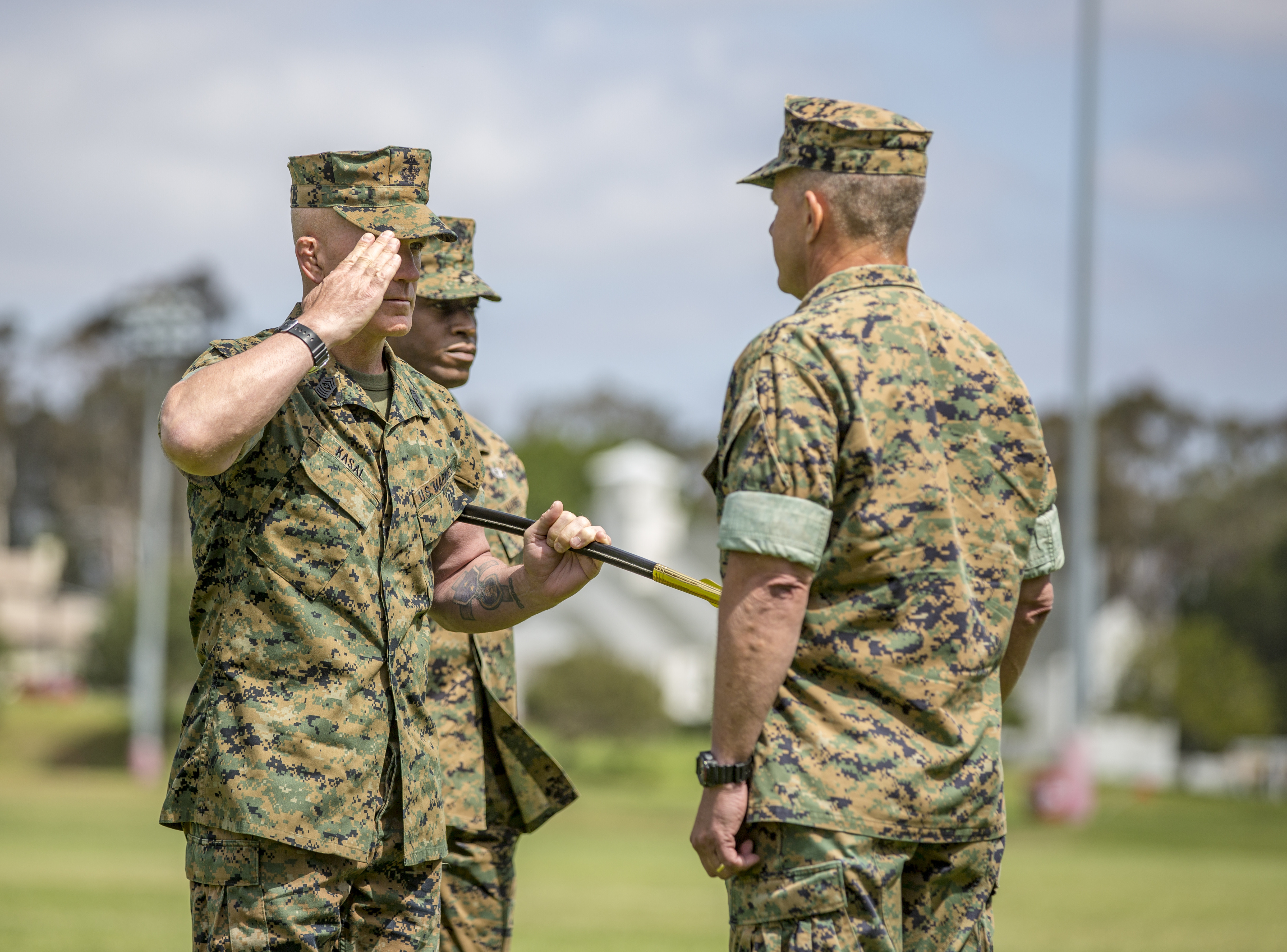 Sgt. Maj. Kasal passes on the sword of office