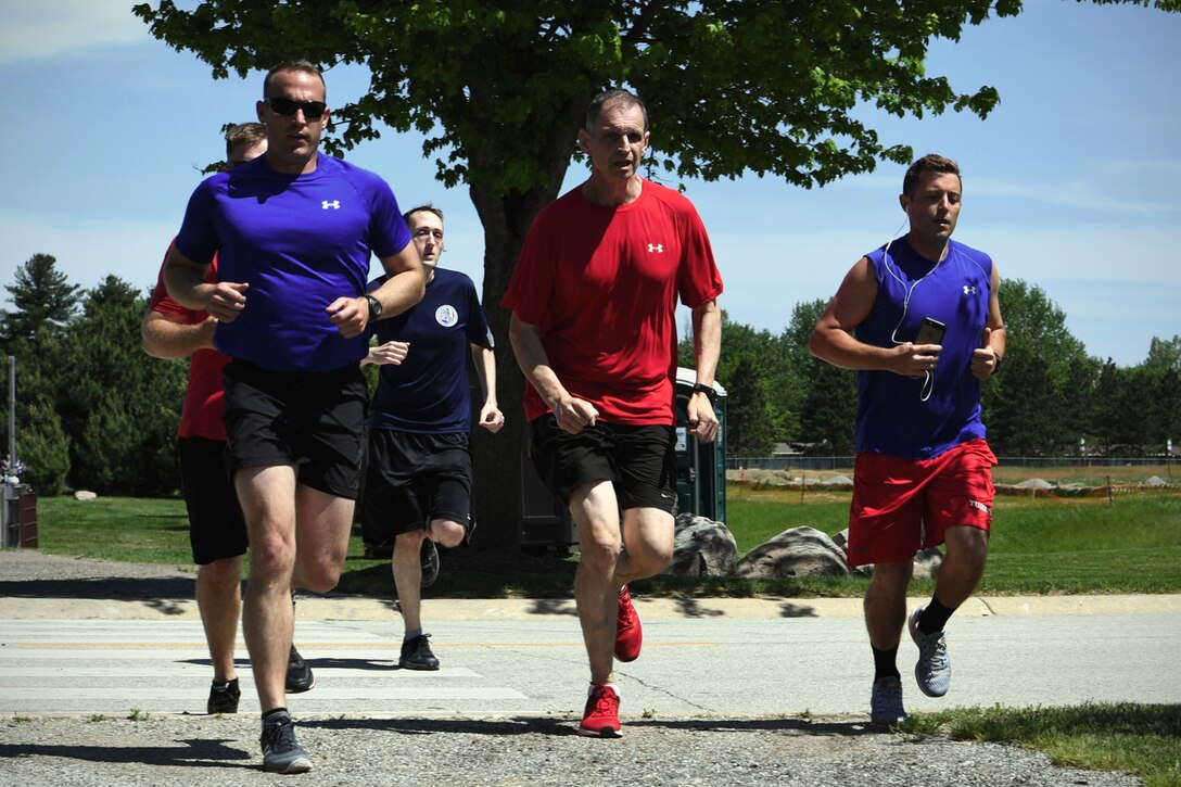 Airmen remember, sweat during Memorial Day run