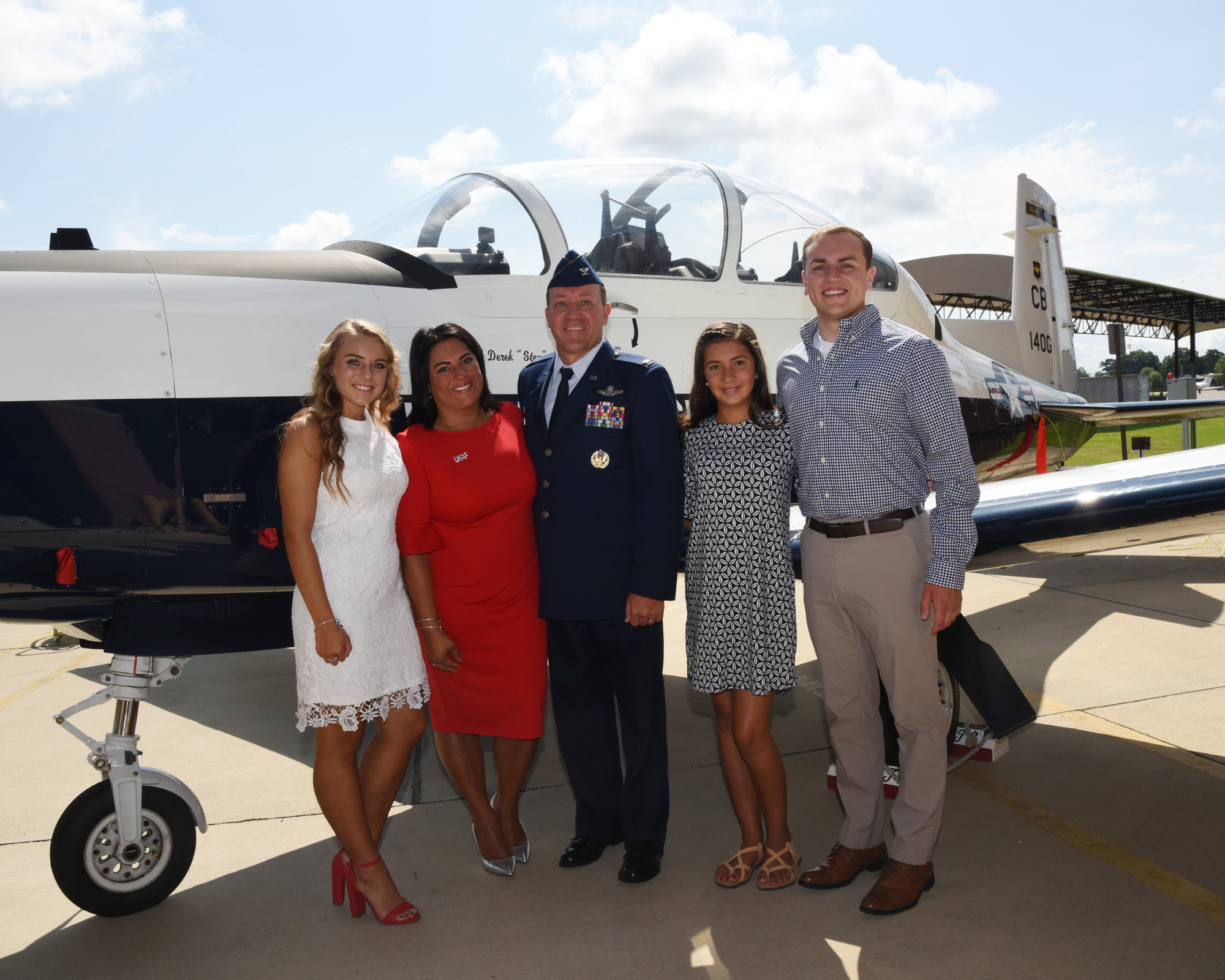 Col. Stuart stand with family after COC