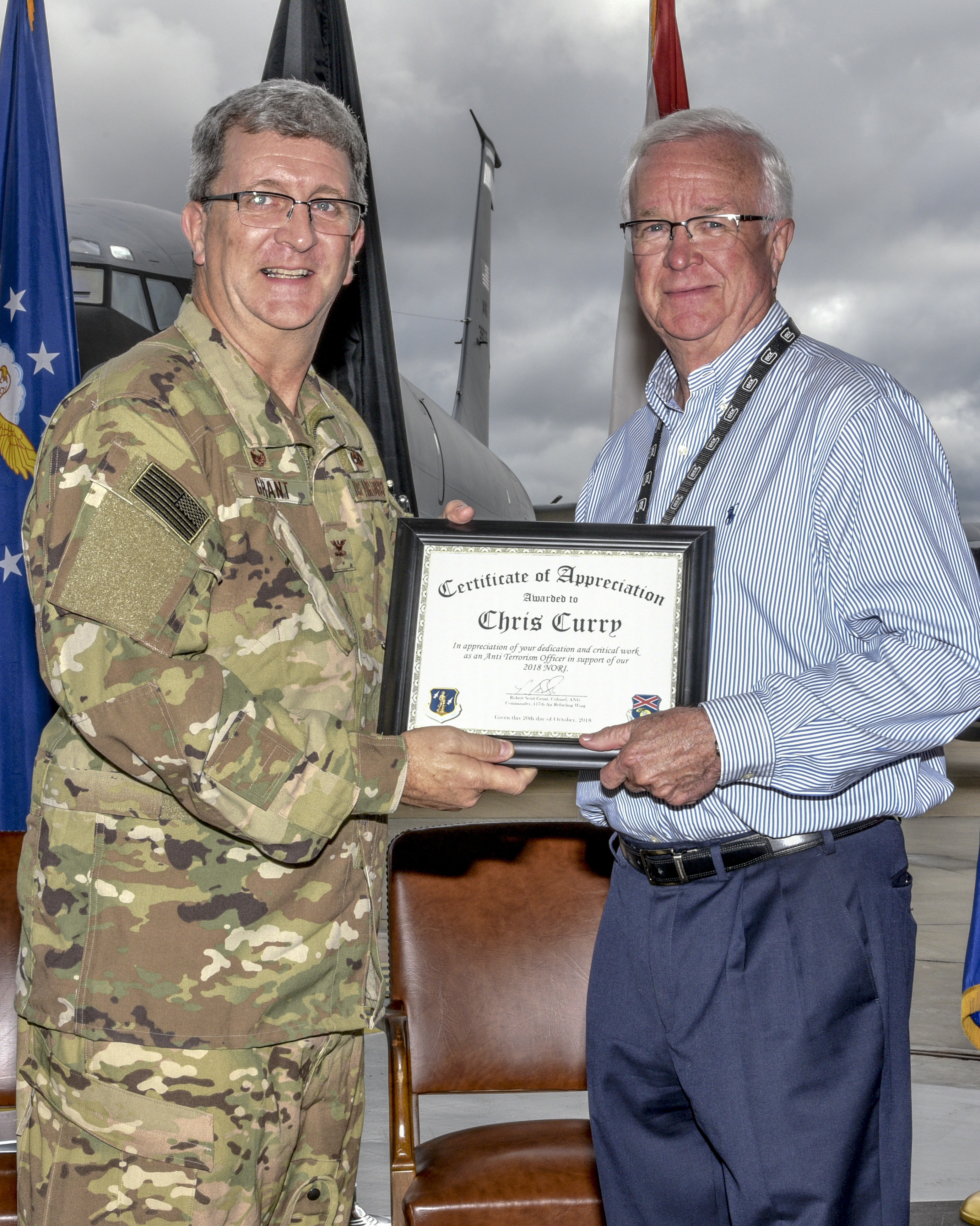 Col. Scott Grant Presents Certificate