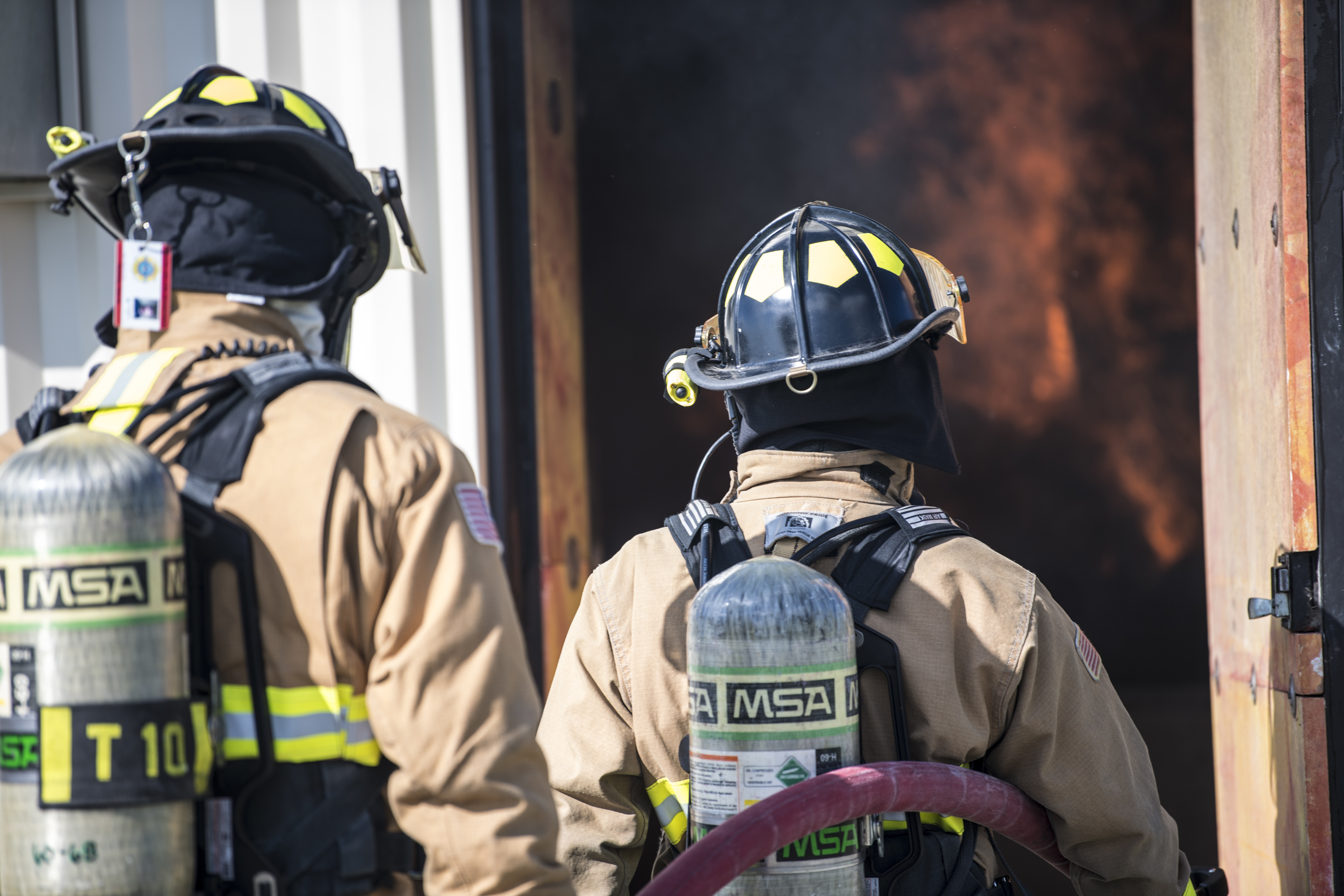 Grissom Firefighters get live fire experience in the Smokehouse ...