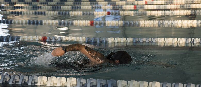 Sailors and Airmen plunge into swim qualification test > Joint Base ...