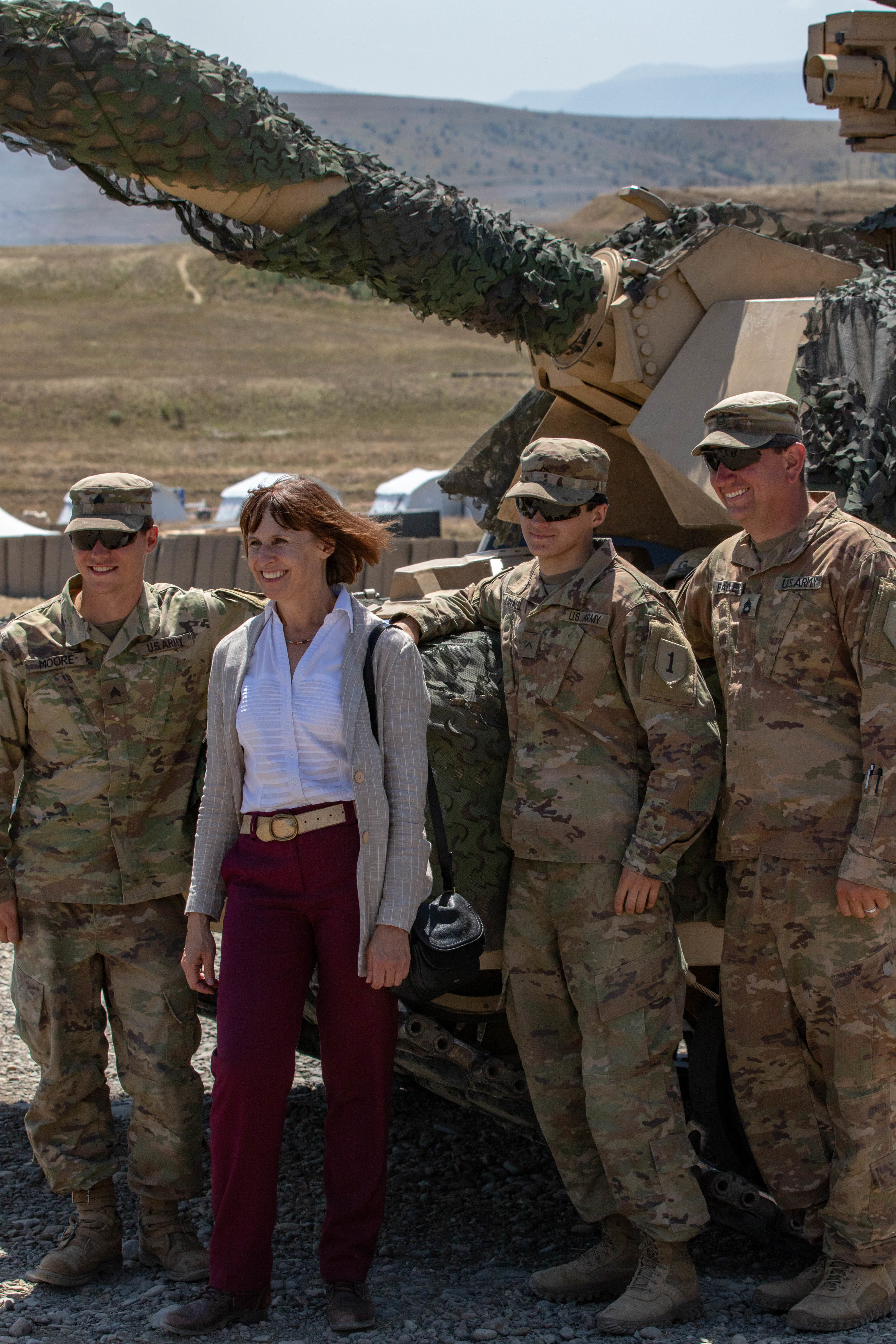 The Chargé d’Affaires to Georgia, Elisabeth Rood, poses with U.S. Army ...