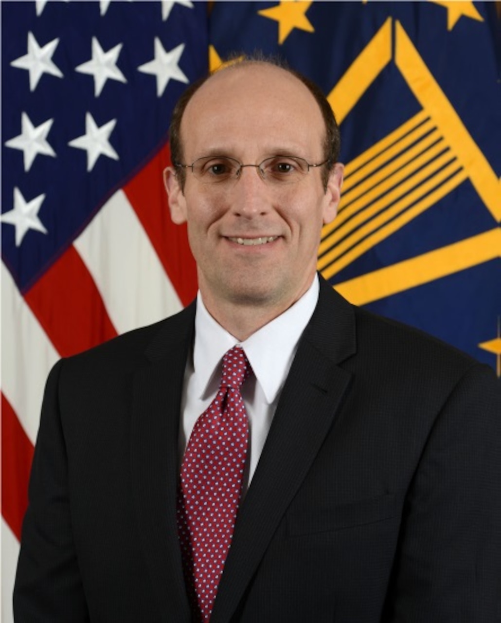 Terence G. Emmert > U.S. Department of War > Biography