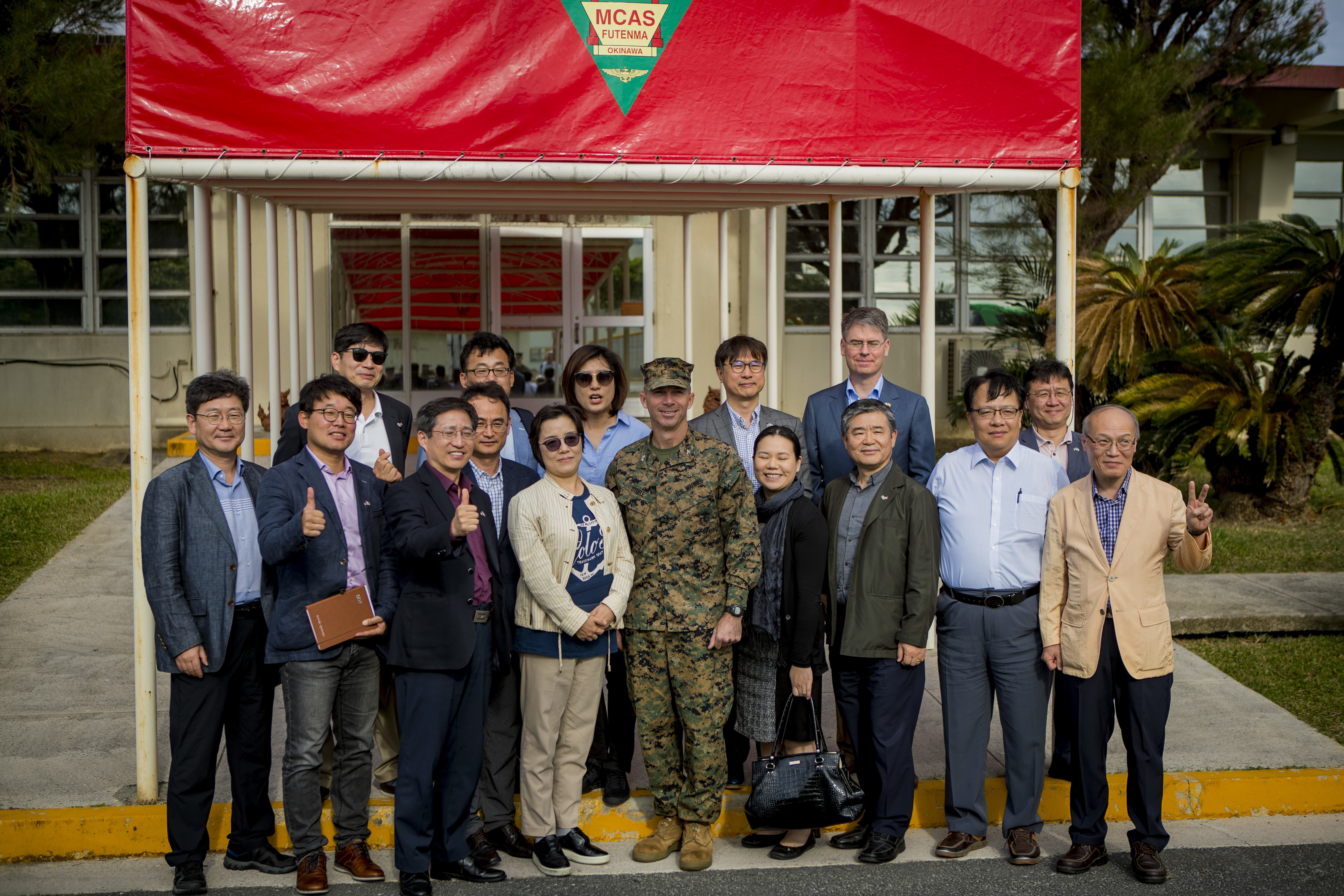 Marine Corps Air Station (MCAS) Futenma takes a group photo with ...
