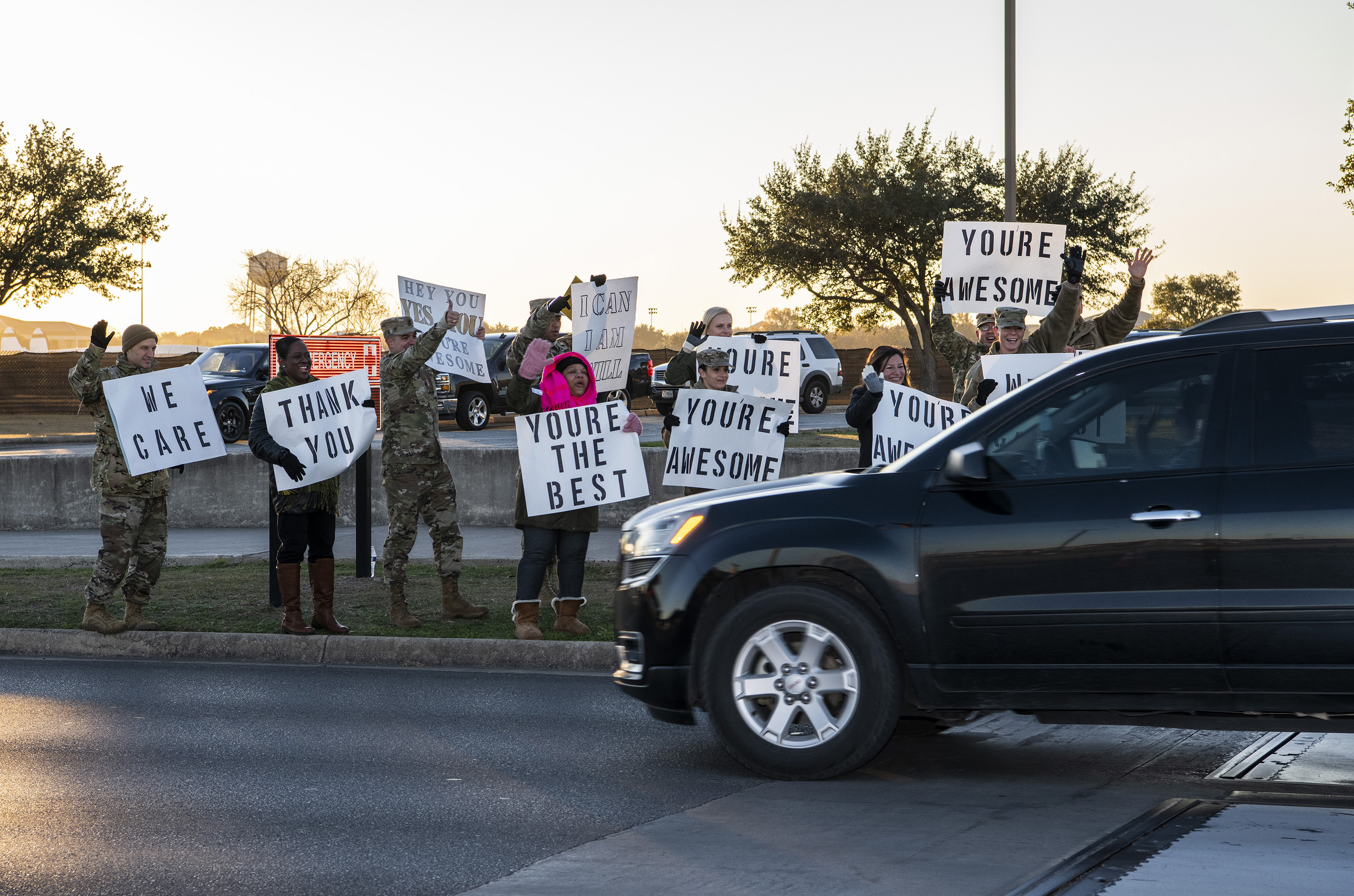 Volunteers show commuters ‘We Care’ at JBSA-Lackland entry gates ...