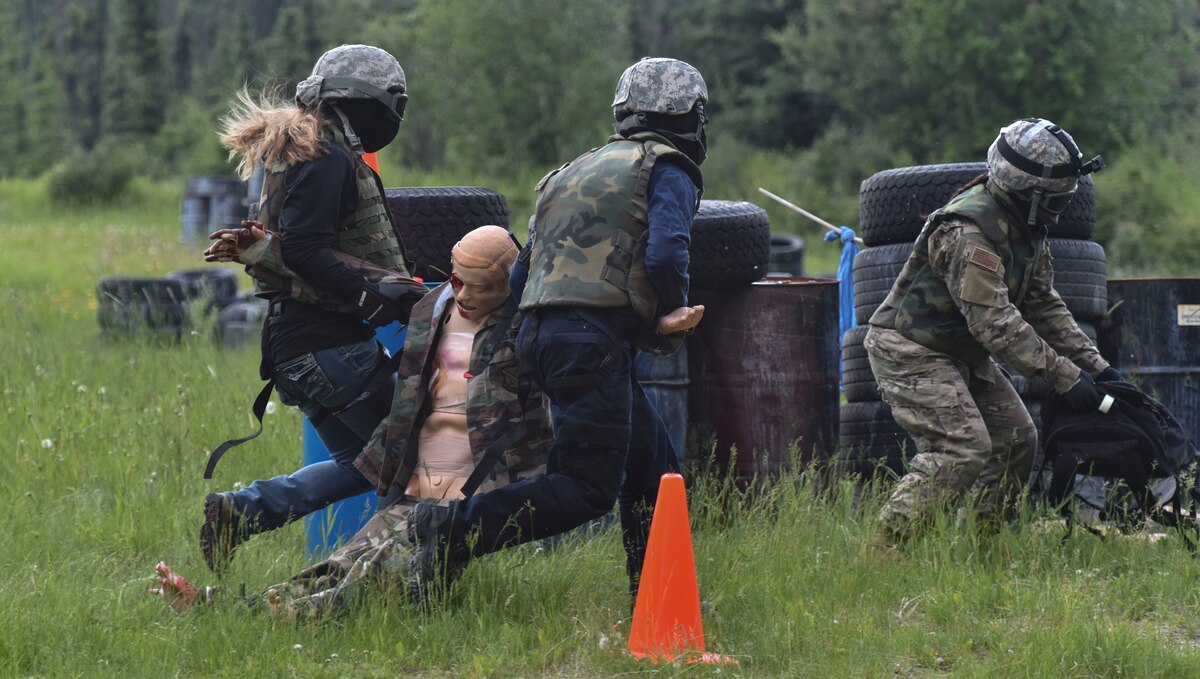 354th SFS, MDG Airmen train to save lives under fire > Eielson Air ...