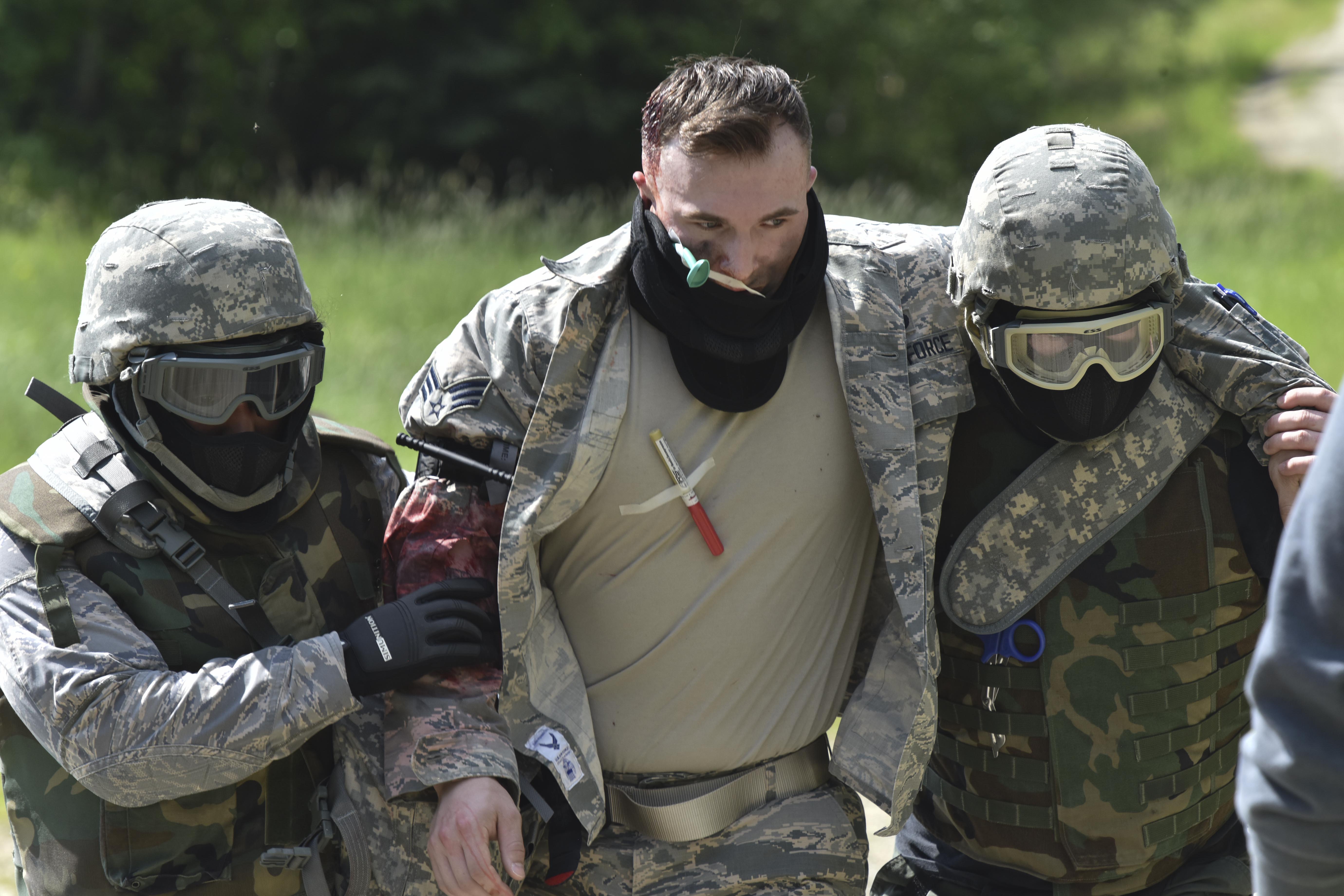 354th SFS, MDG Airmen train to save lives under fire > Eielson Air ...