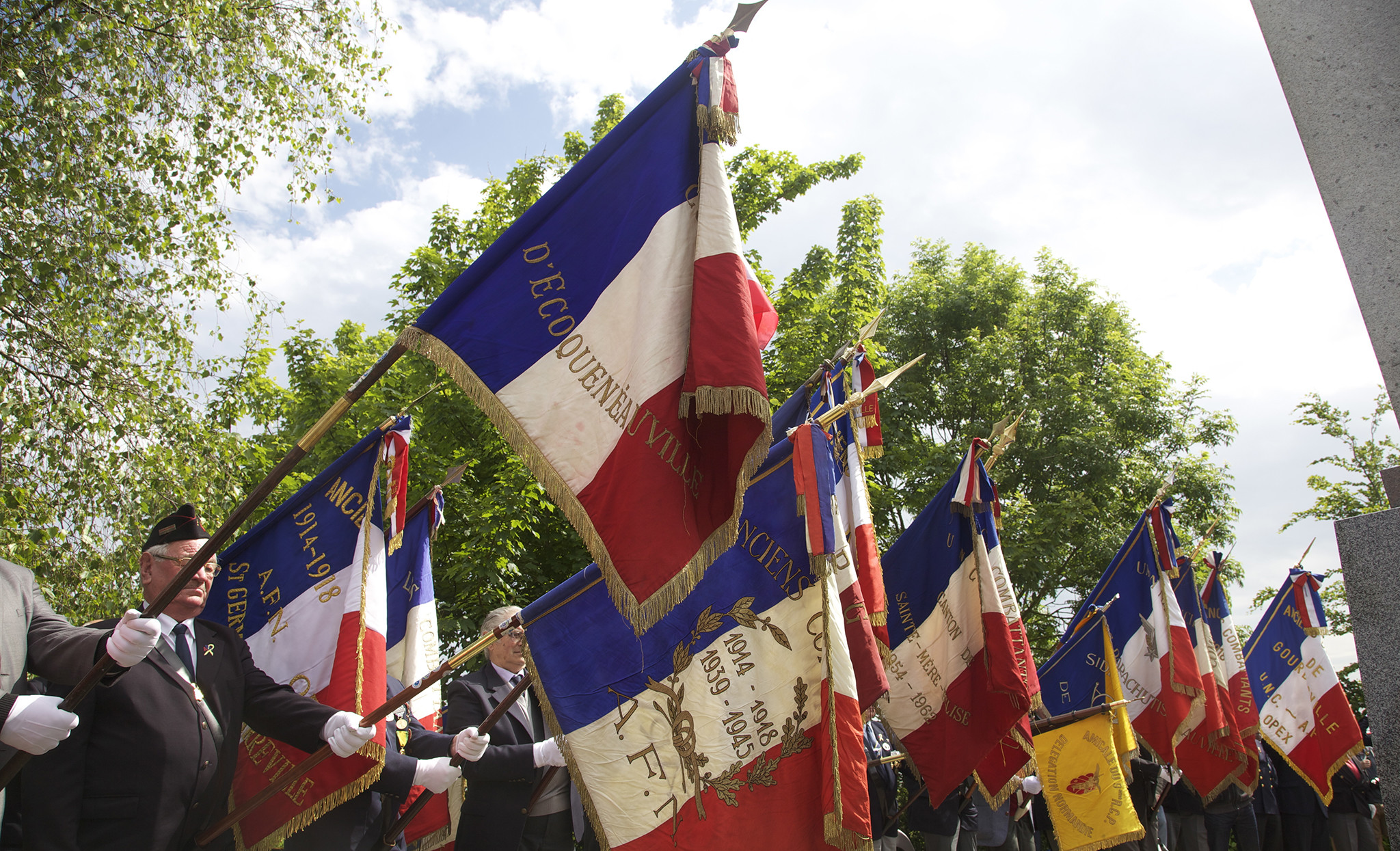 A group of French Veterans present the Colors during a ceremony in ...