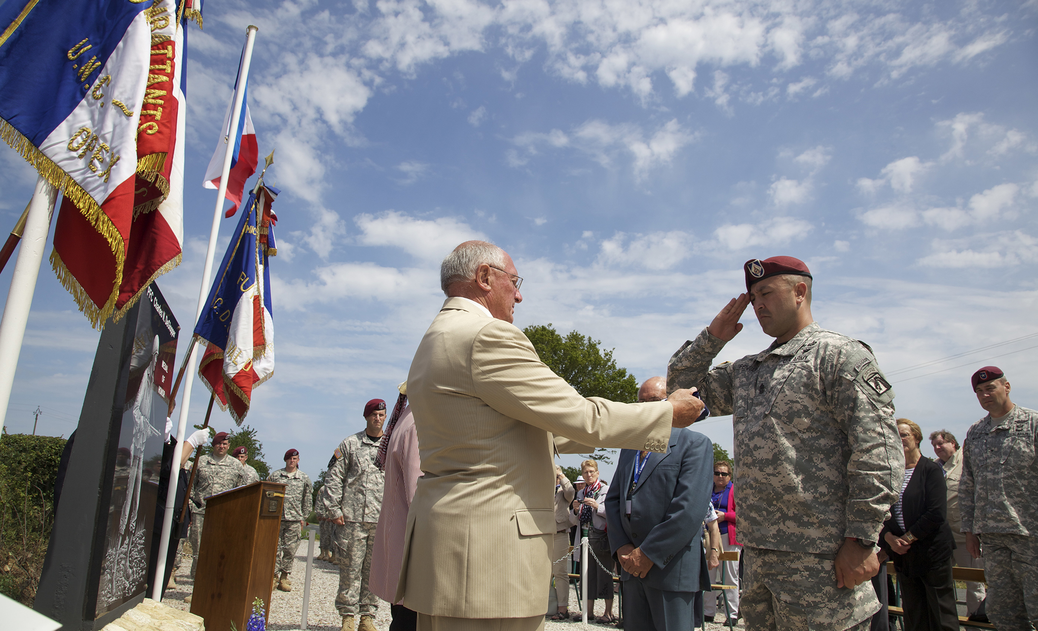 U.S. Army 1st Sgt. Timothy Pennartz of the 18th Airborne Corps, salutes ...