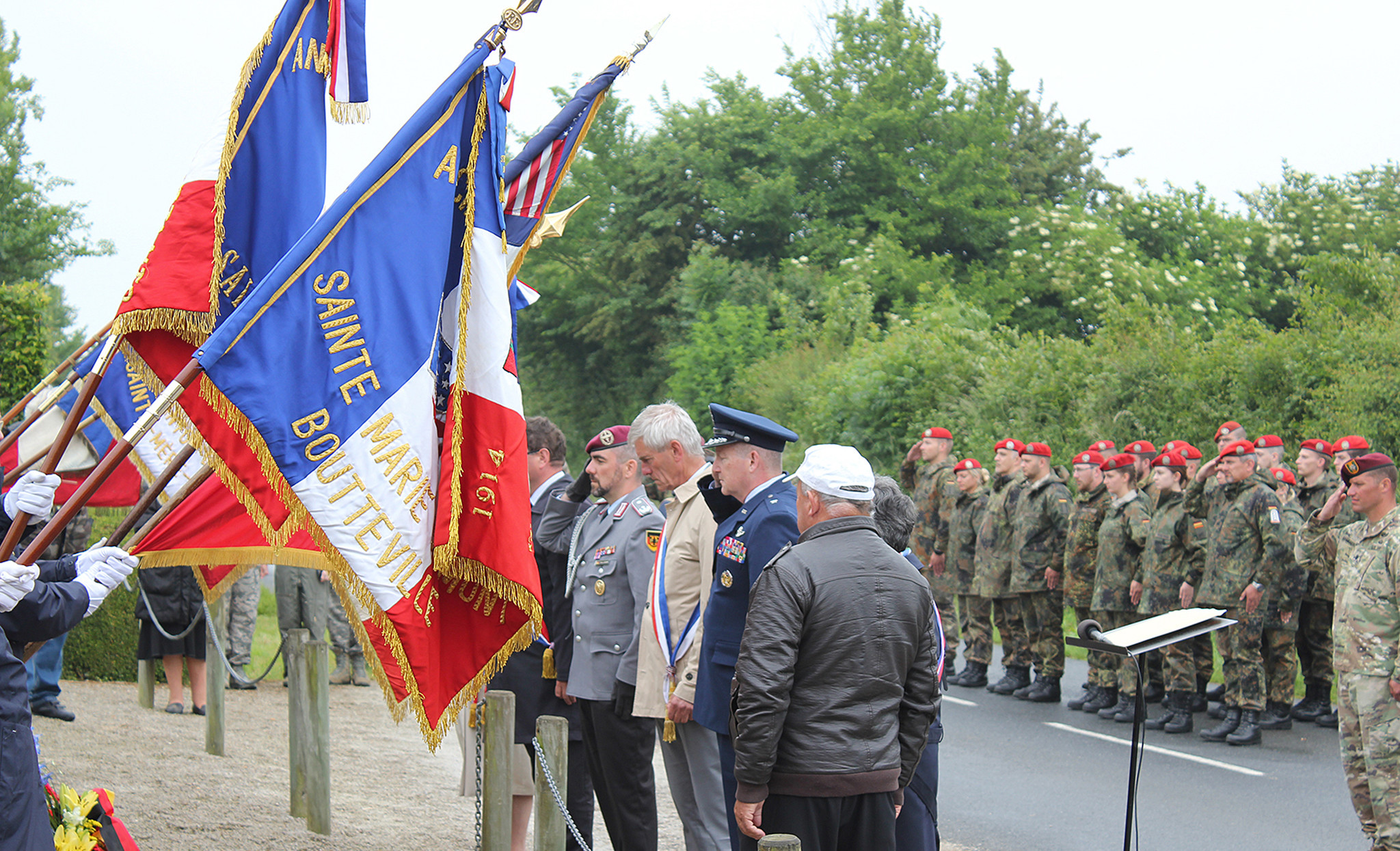 Brig. Gen. John D. Slocum and French officials in Foucarville, France