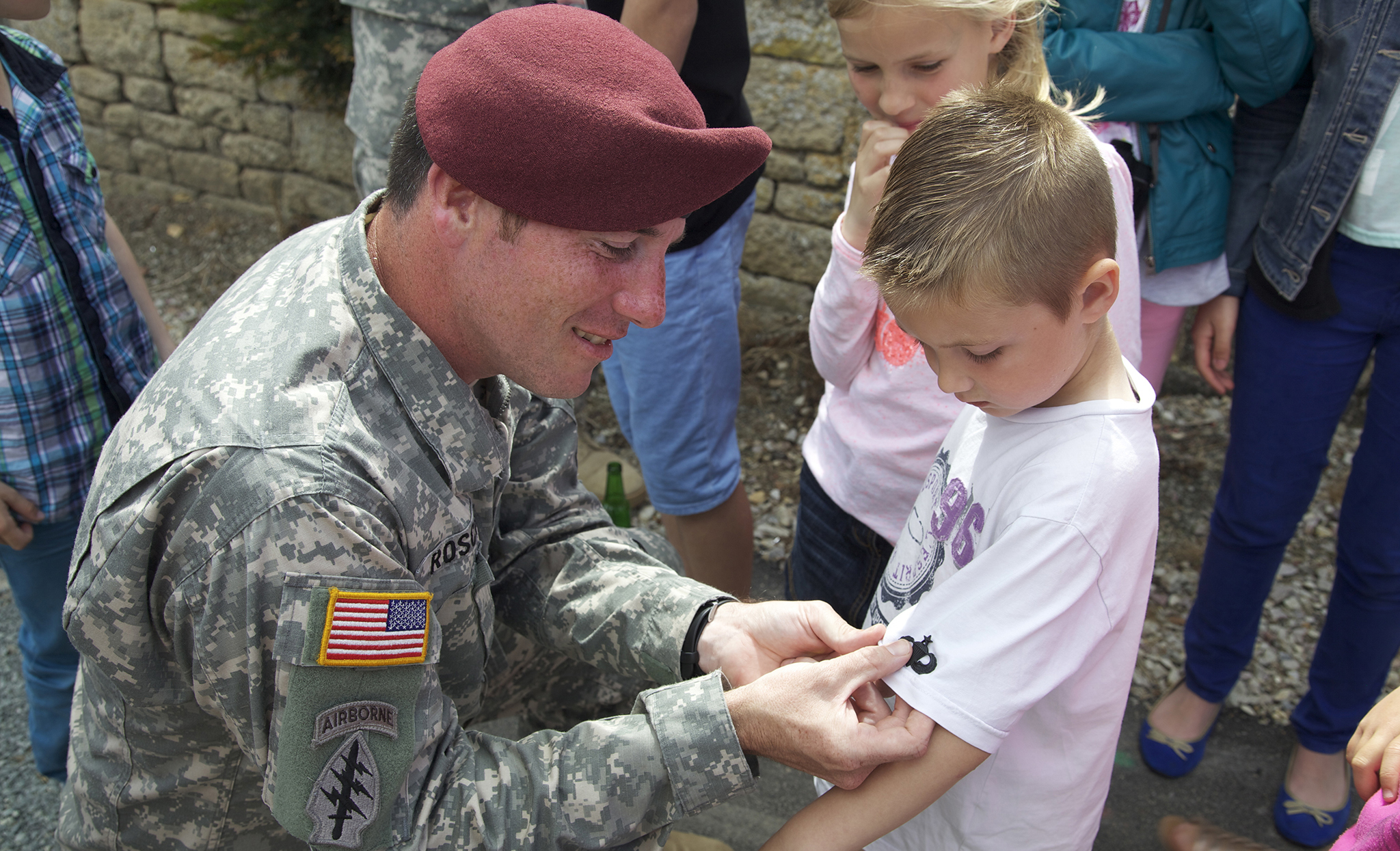 Master Sgt. Kyle Roscoe pins U.S. Army Jumpmaster wings to a French ...