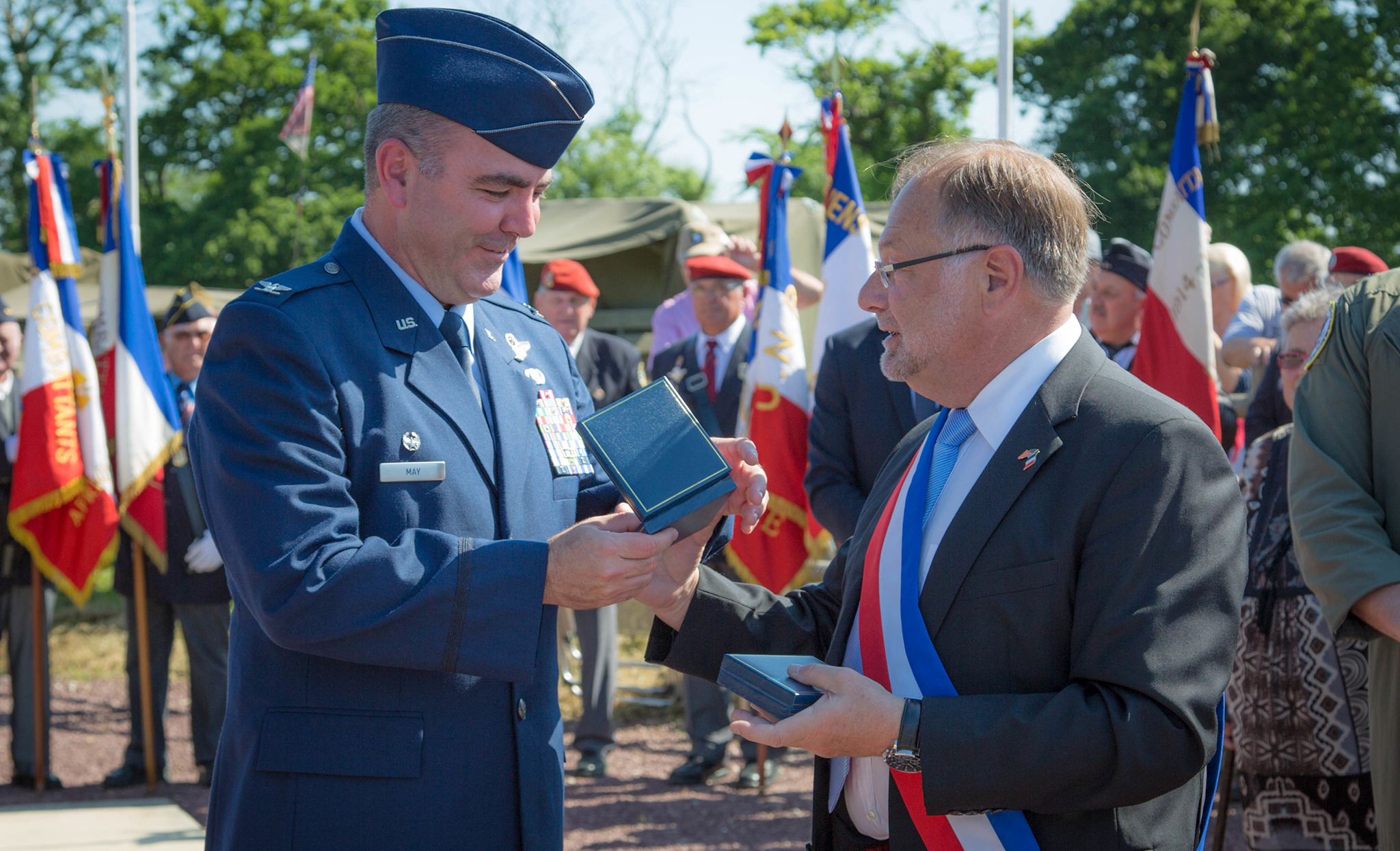 U.S. Air Force Colonel Brian May receives a special medal at a ceremony ...
