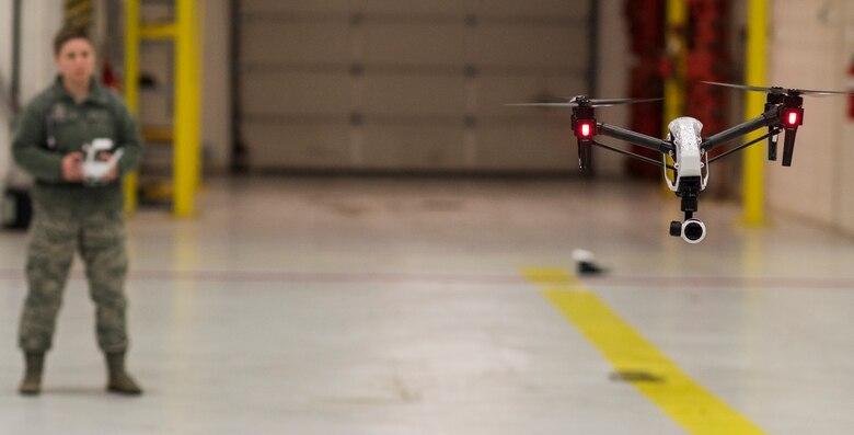 JBA security personnel lean forward to address small unmanned aerial ...