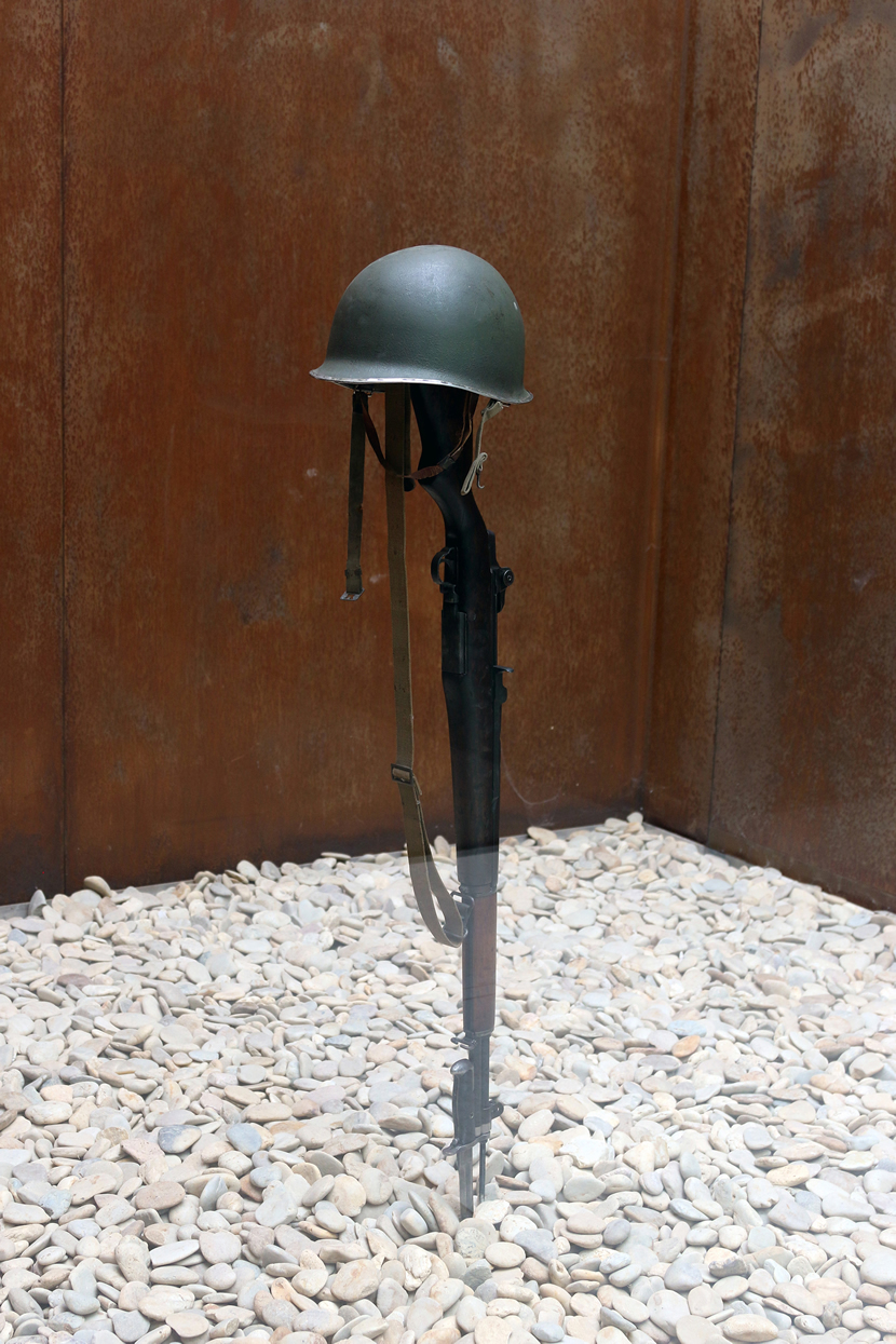 A Soldiers Cross on display inside the Normandy American Cemetery ...