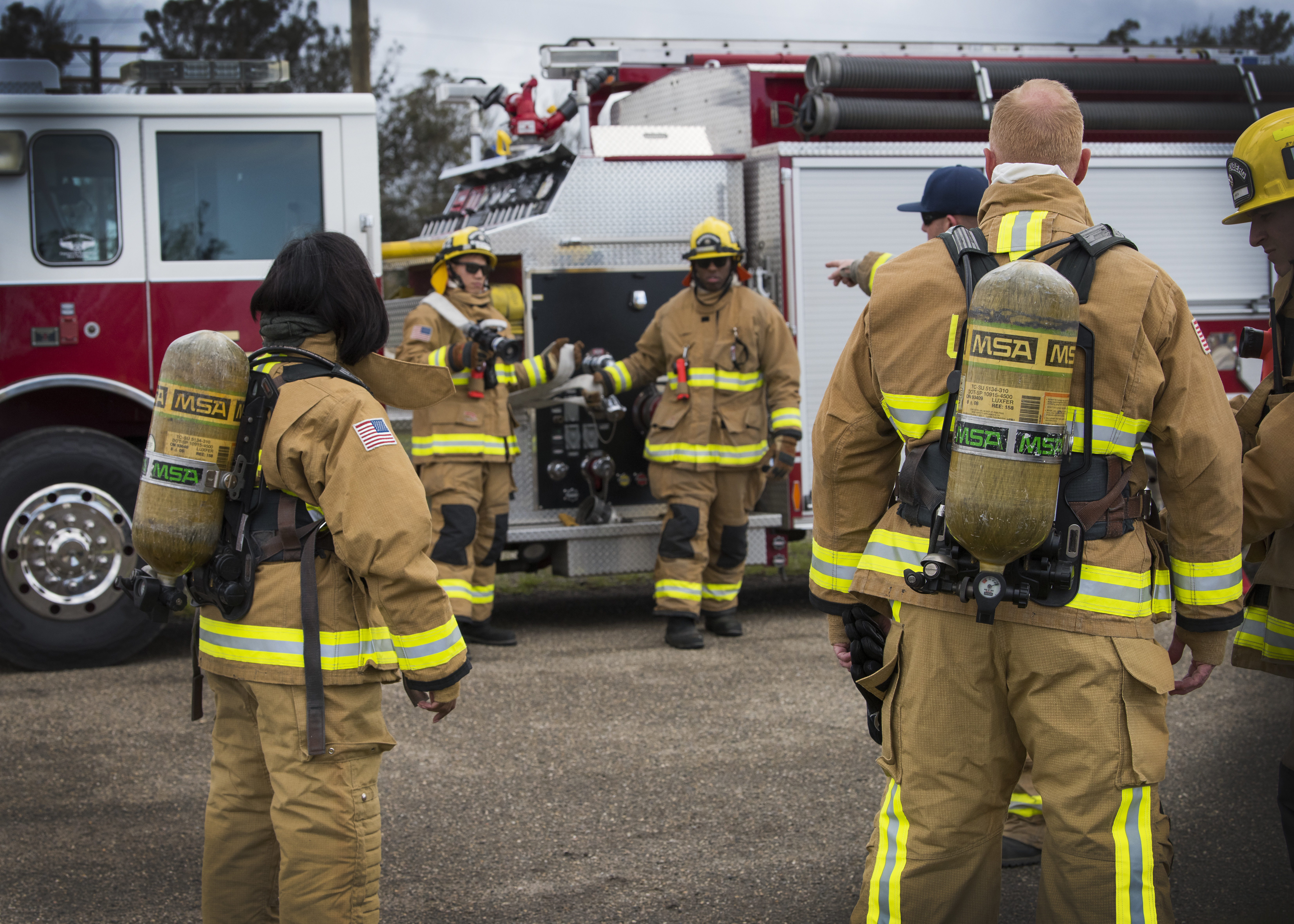 Base commander and command chief join fire team for exercise ...