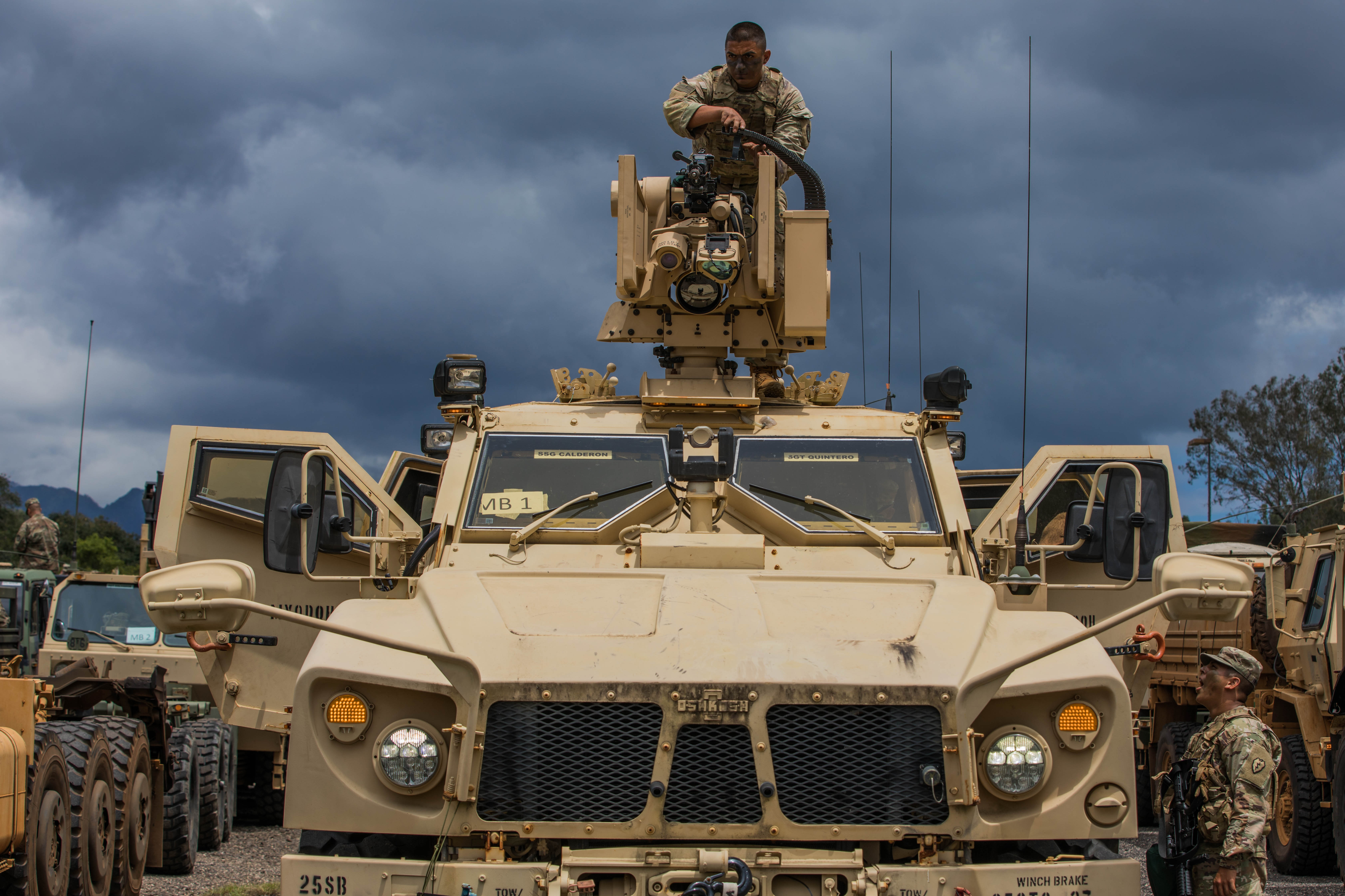 Soldiers receive and stage equipment before moving it to a logistics ...