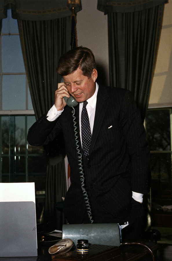 President Kennedy on phone in Oval Office