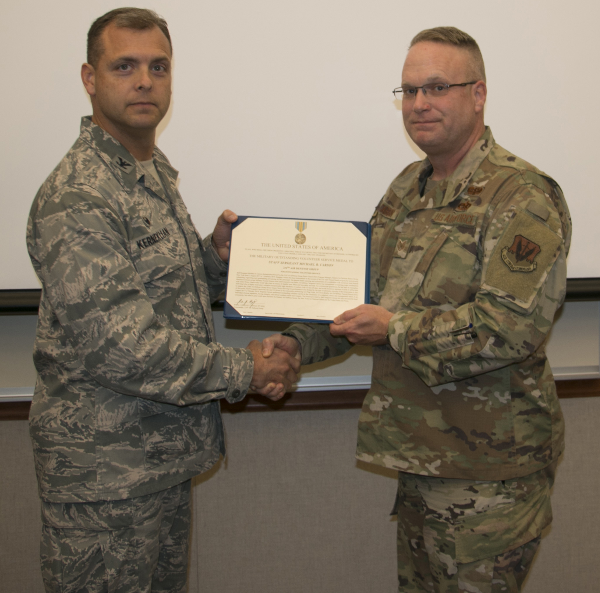 Lewis, Carson Receive Medals > Eastern Air Defense Sector > Article Display