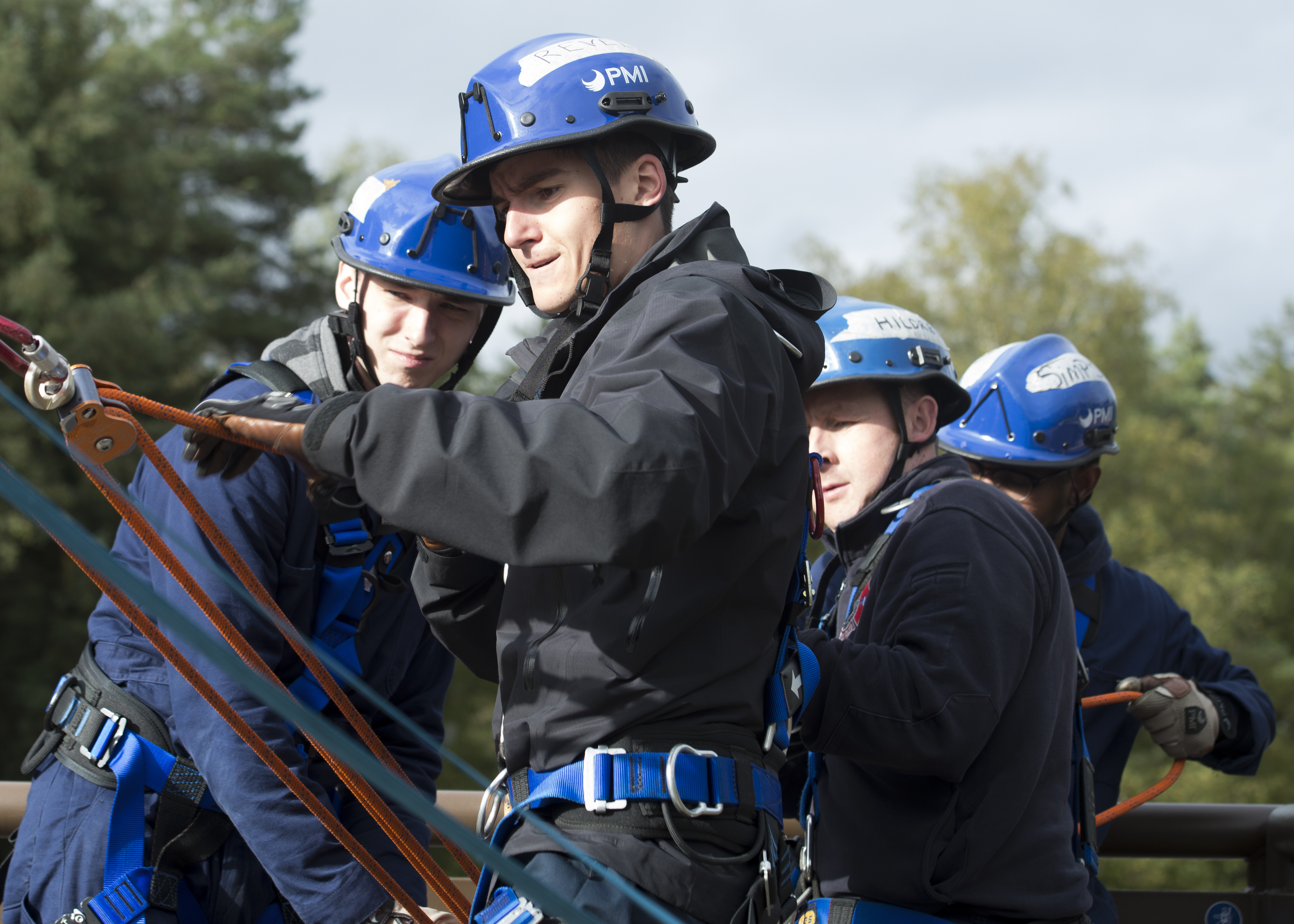 Firefighters qualify on rescue techniques during rescue technician course